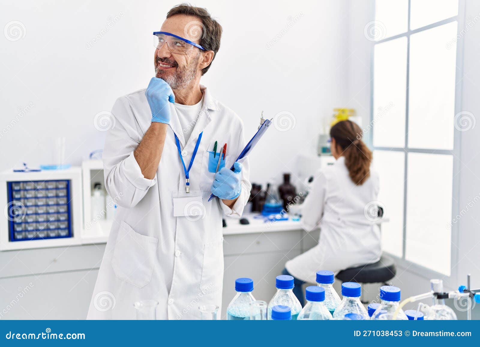 Middle Age Man Working at Scientist Laboratory Serious Face Thinking ...