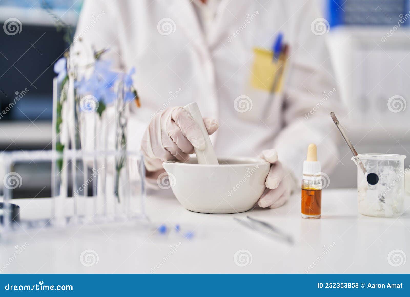 Middle Age Woman Scientist Mixing Sample at Laboratory Stock Photo ...
