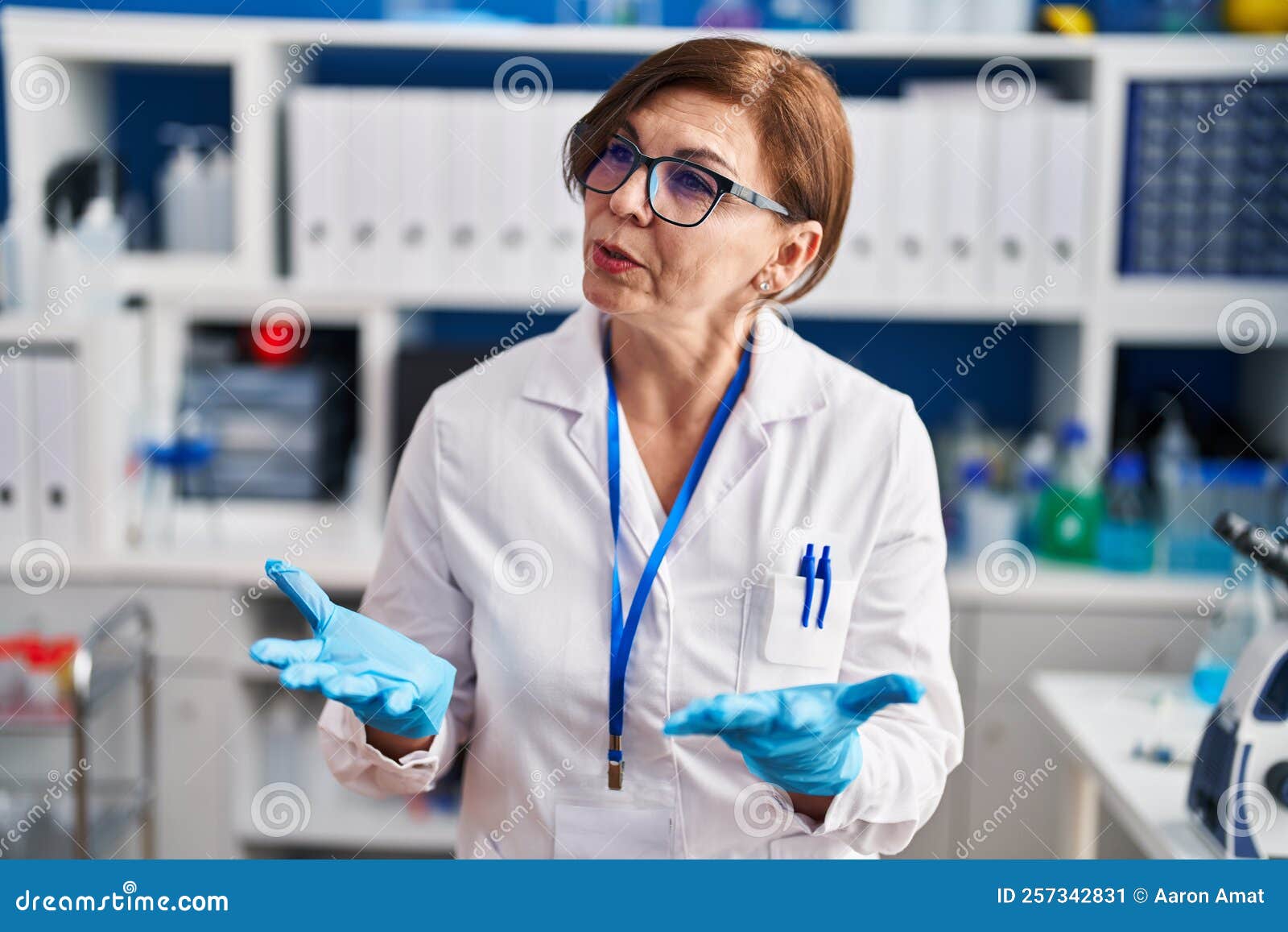 Middle Age Woman Scientist Smiling Confident Speaking at Laboratory ...