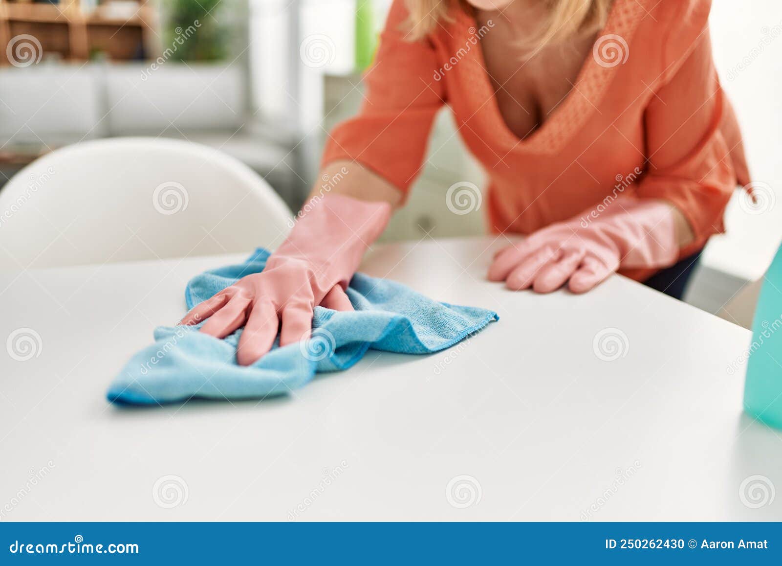 Middle Age Woman Smiling Happy Cleaning Using Diffuser and Rag at Home ...