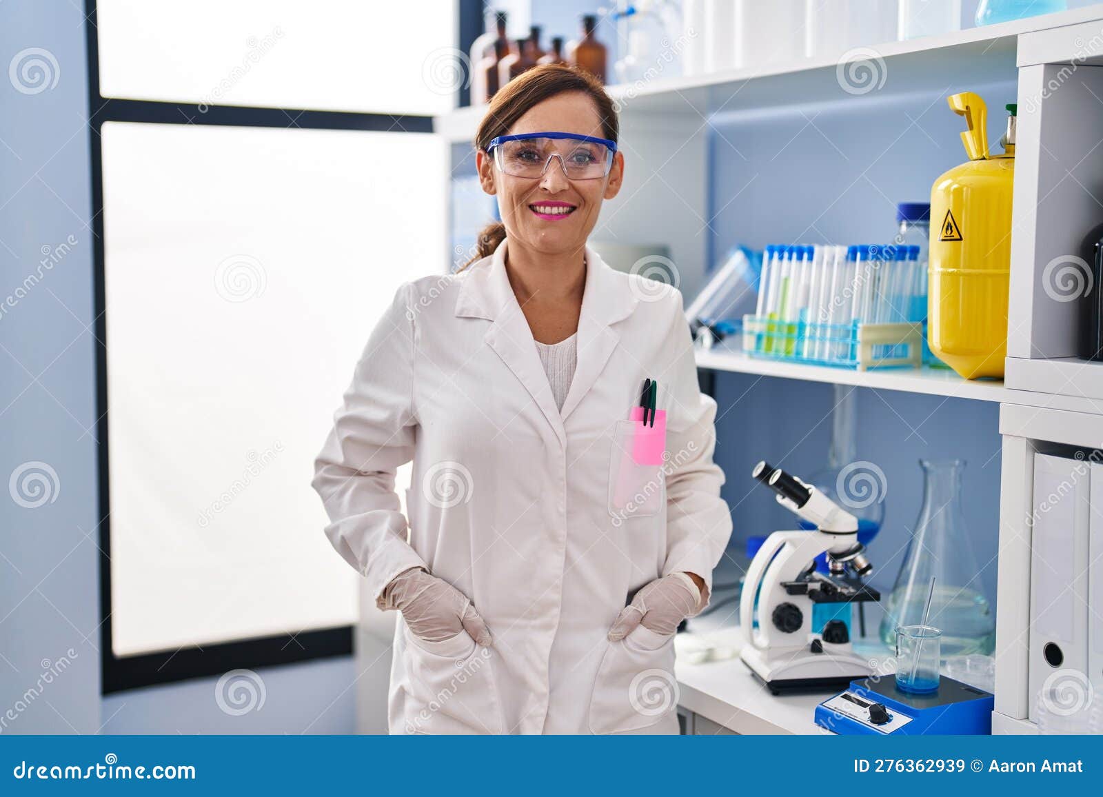 Middle Age Woman Wearing Scientist Uniform Standing at Laboratory Stock ...