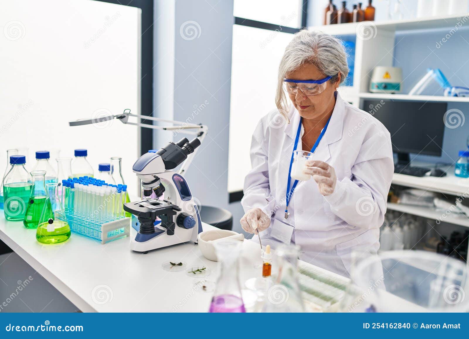 Middle Age Woman Wearing Scientist Uniform Working at Laboratory Stock ...