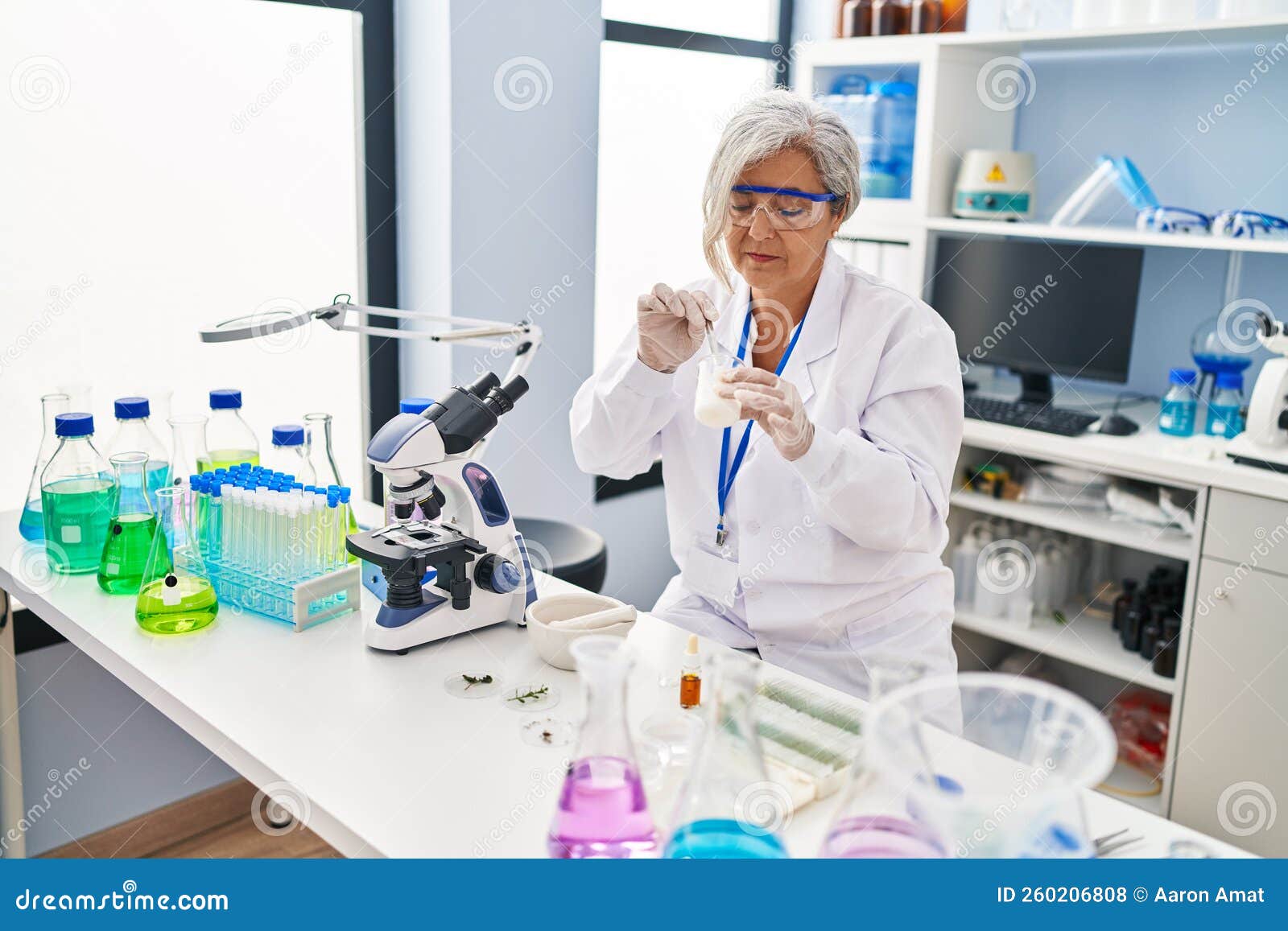 Middle Age Woman Wearing Scientist Uniform Working at Laboratory Stock ...