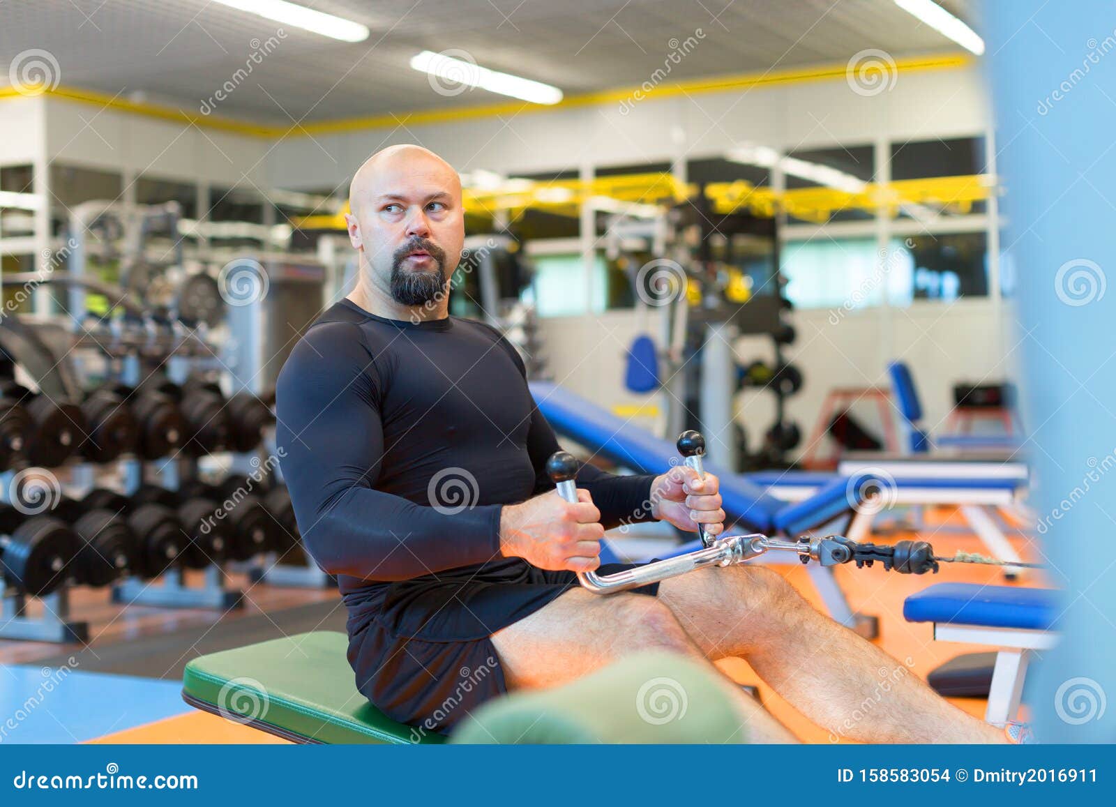 Middle Aged Athlete Doing Workouts on a Back with Power Exercise ...