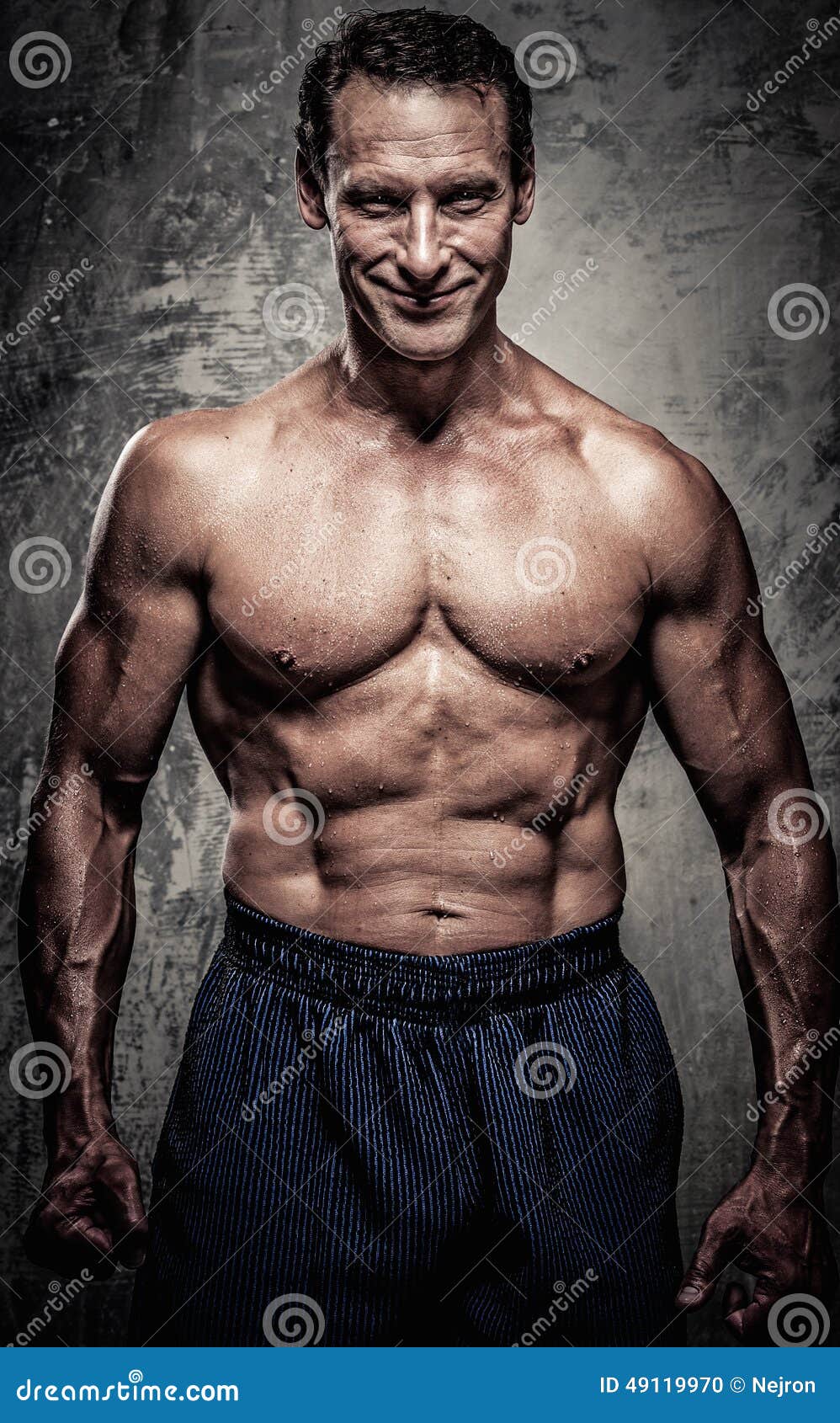 Middle-aged athletic man stock photo. Image of lifting - 49119970