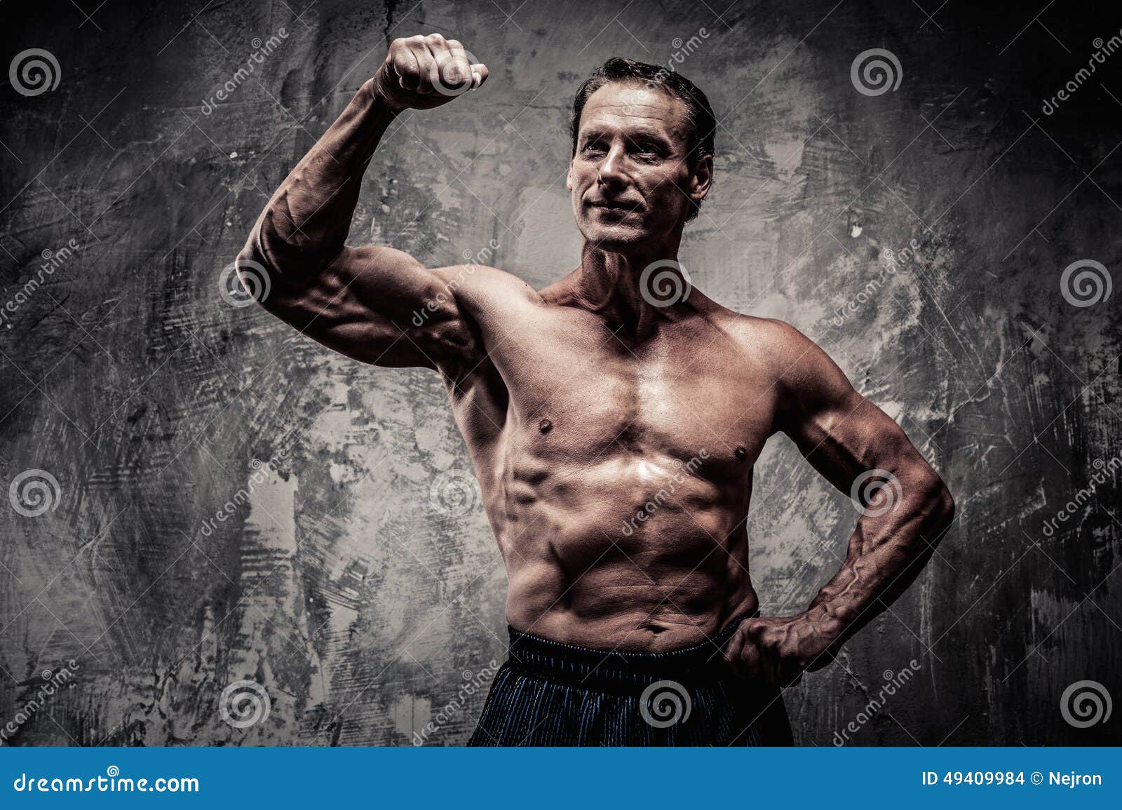Middle-aged athletic man stock photo. Image of bodybuilder - 49409984