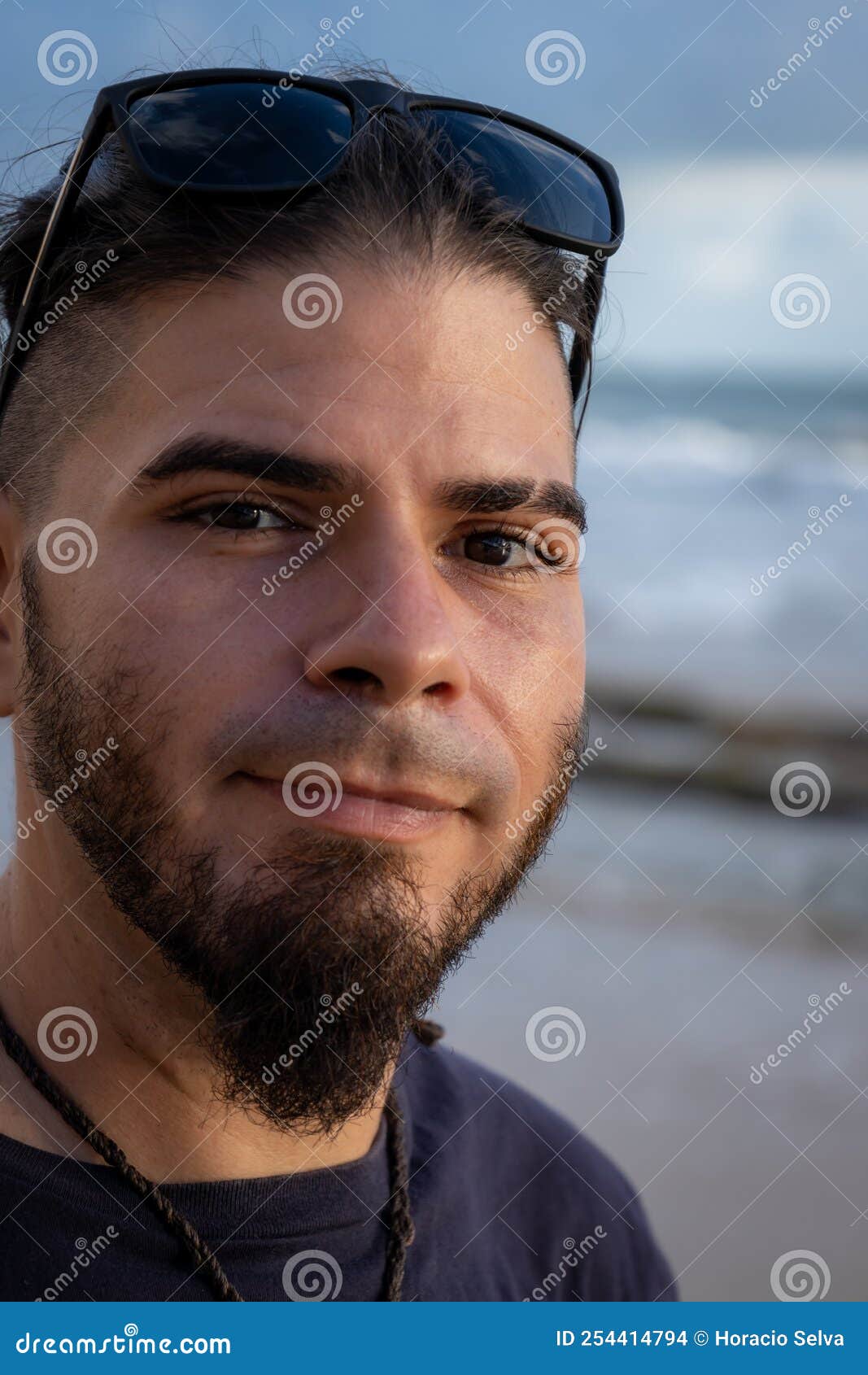 Middle-aged Bearded Man on the Beach Looking Directly at Camera Stock ...