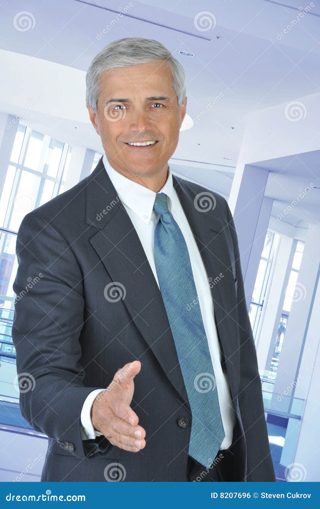 Middle Aged Businessman with Extended Hand Stock Photo - Image of ...