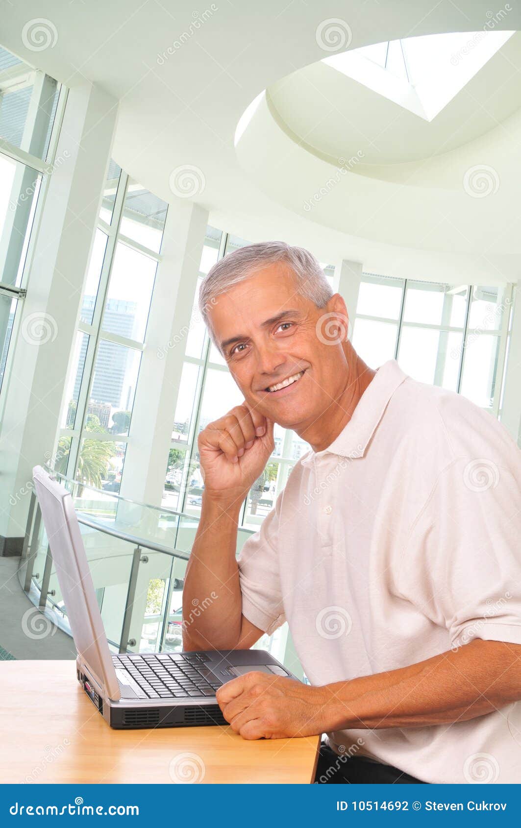 Middle Aged Businessman Seated at Computer Stock Photo - Image of happy ...