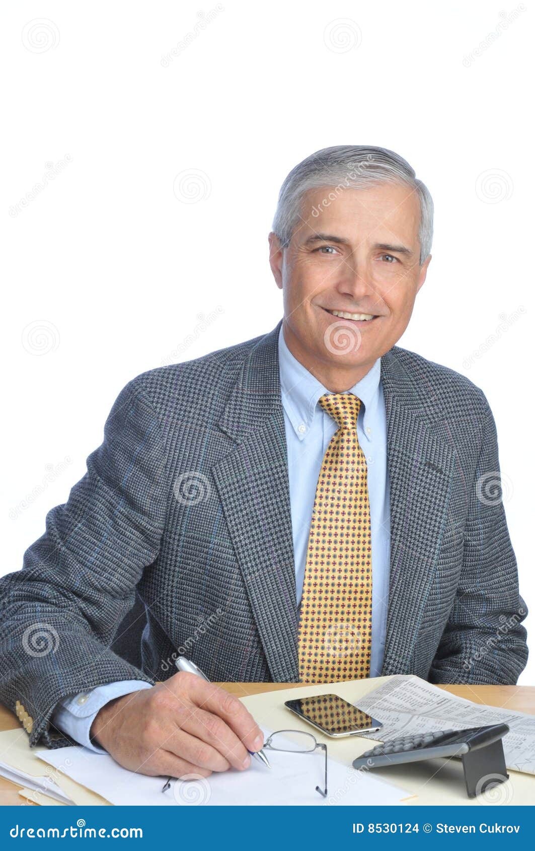 Middle Aged Businessman Sitting at Desk Isolated Stock Photo - Image of ...
