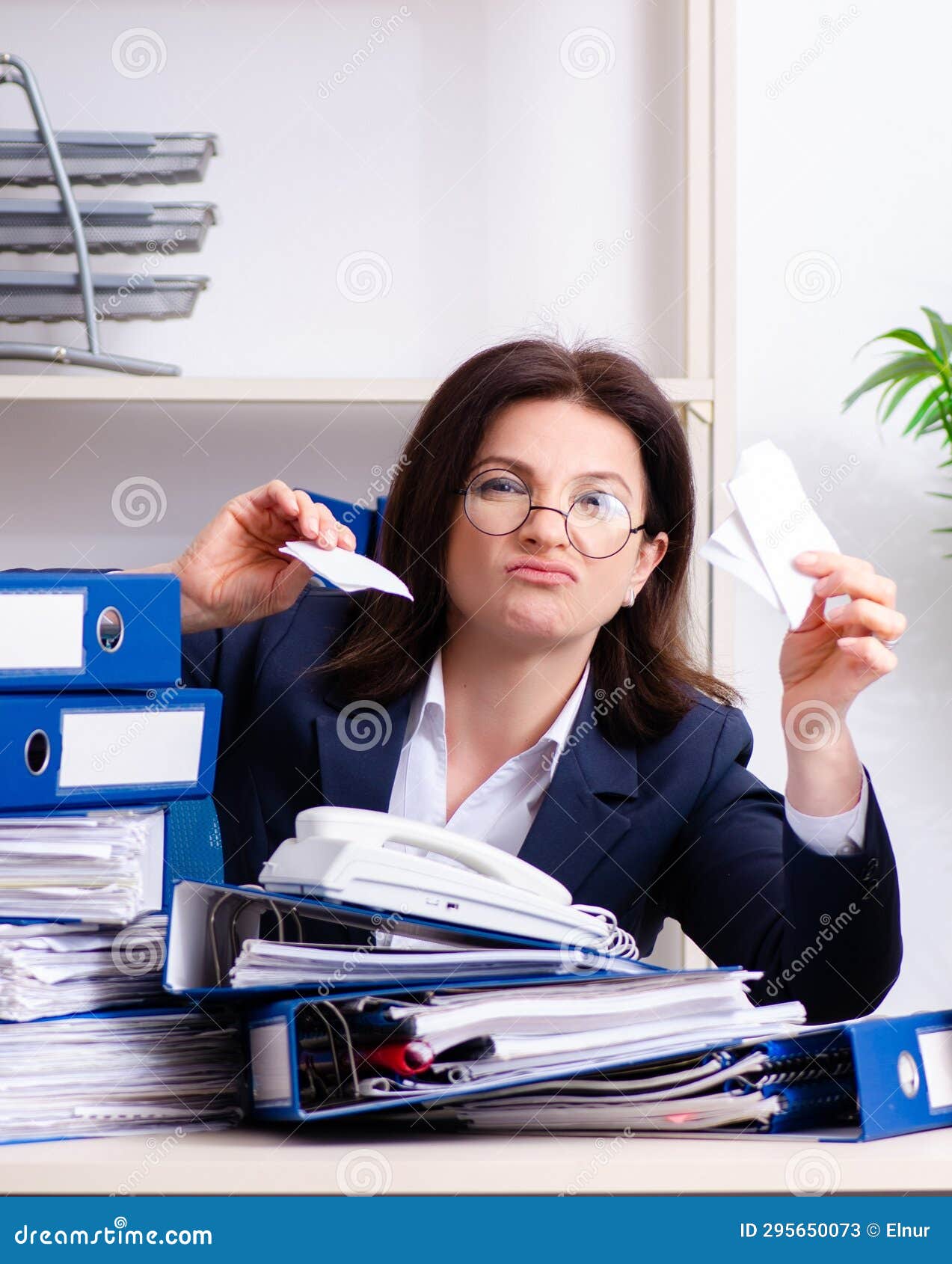 Middle-aged Businesswoman Unhappy with Excessive Work Stock Image ...