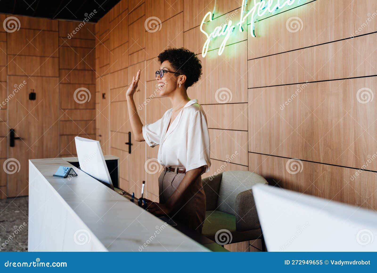 Middle-aged Businesswoman Working on Desktop Computer at Reception ...