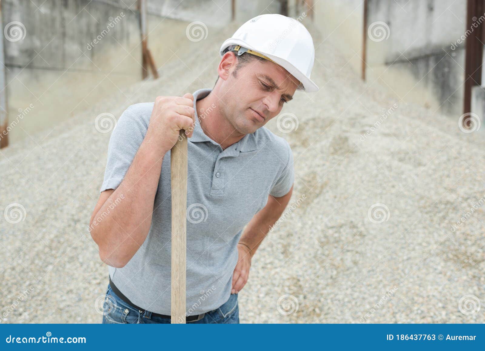 Middle-aged Construction Worker with Back Pain Stock Image - Image of ...