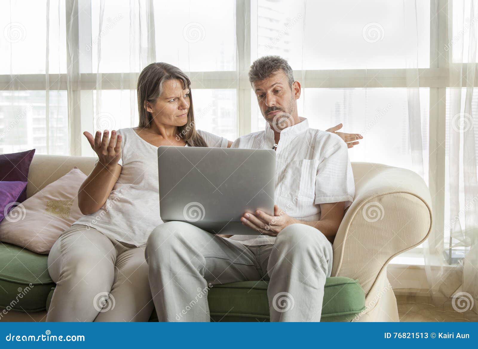 Middle Aged Couple with a Computer Stock Image - Image of aged, couch ...