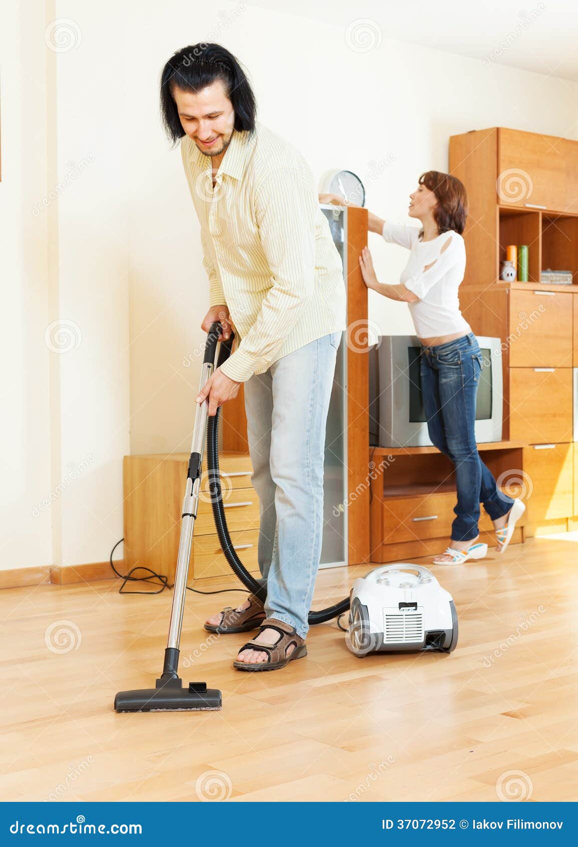 Middle-aged Couple Doing Housework Together Stock Photo - Image of ...