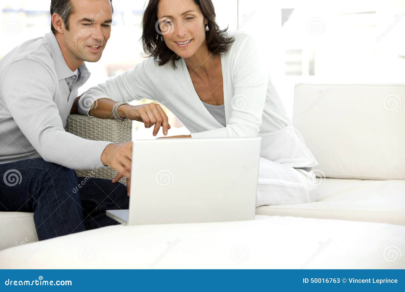 Middle-aged Couple Using Laptop Stock Image - Image of electronic ...