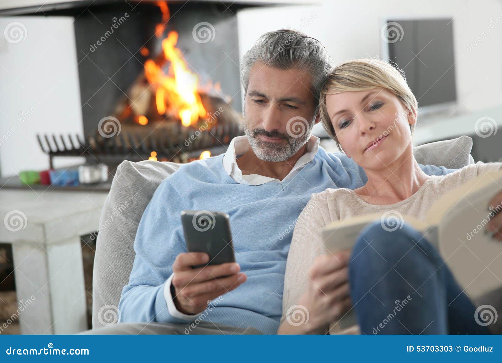 Middle-aged Couple Using Smartphones Stock Image - Image of ...