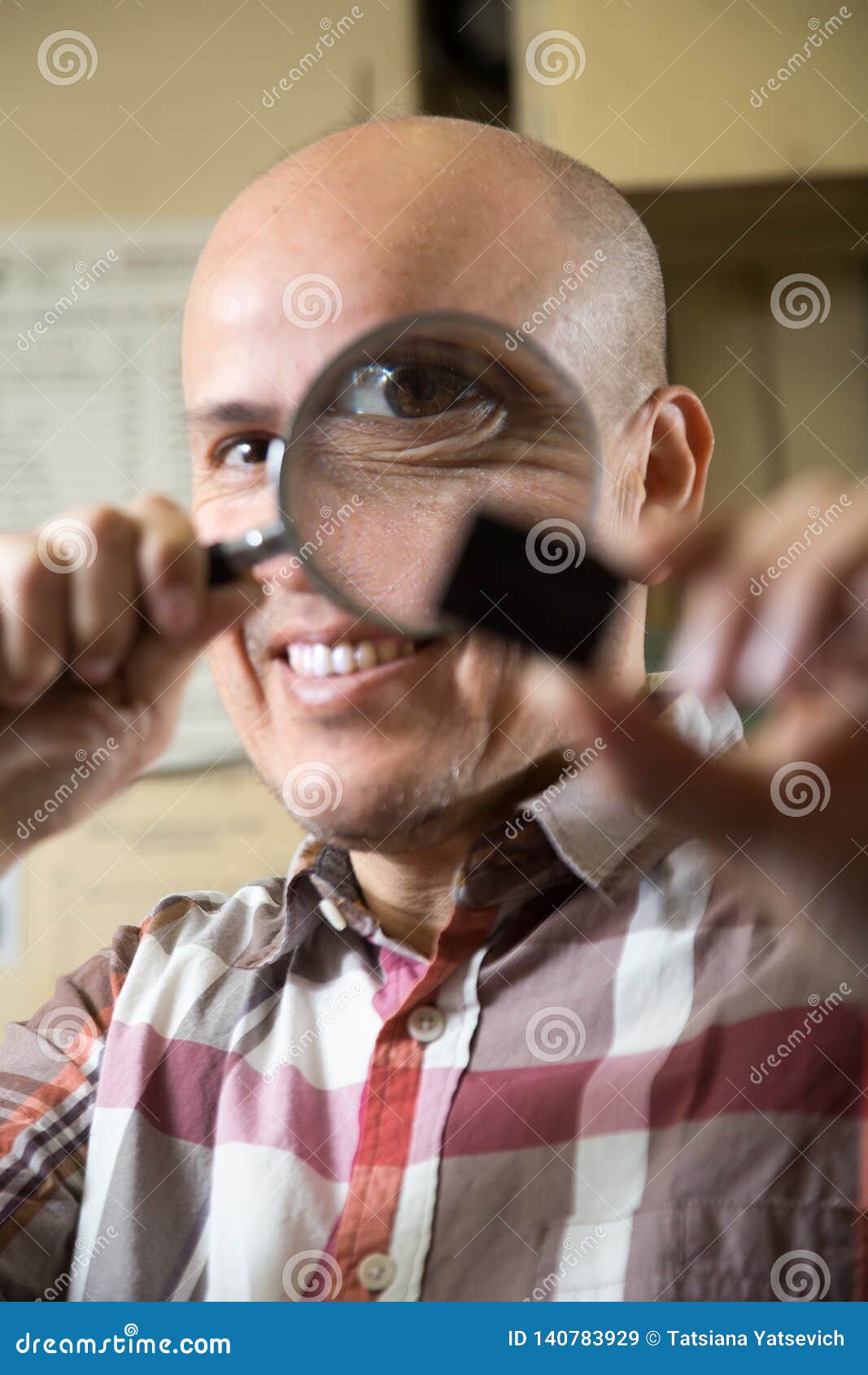 Middle-aged Worker Holding a Magnifying Glass Stock Image - Image of ...