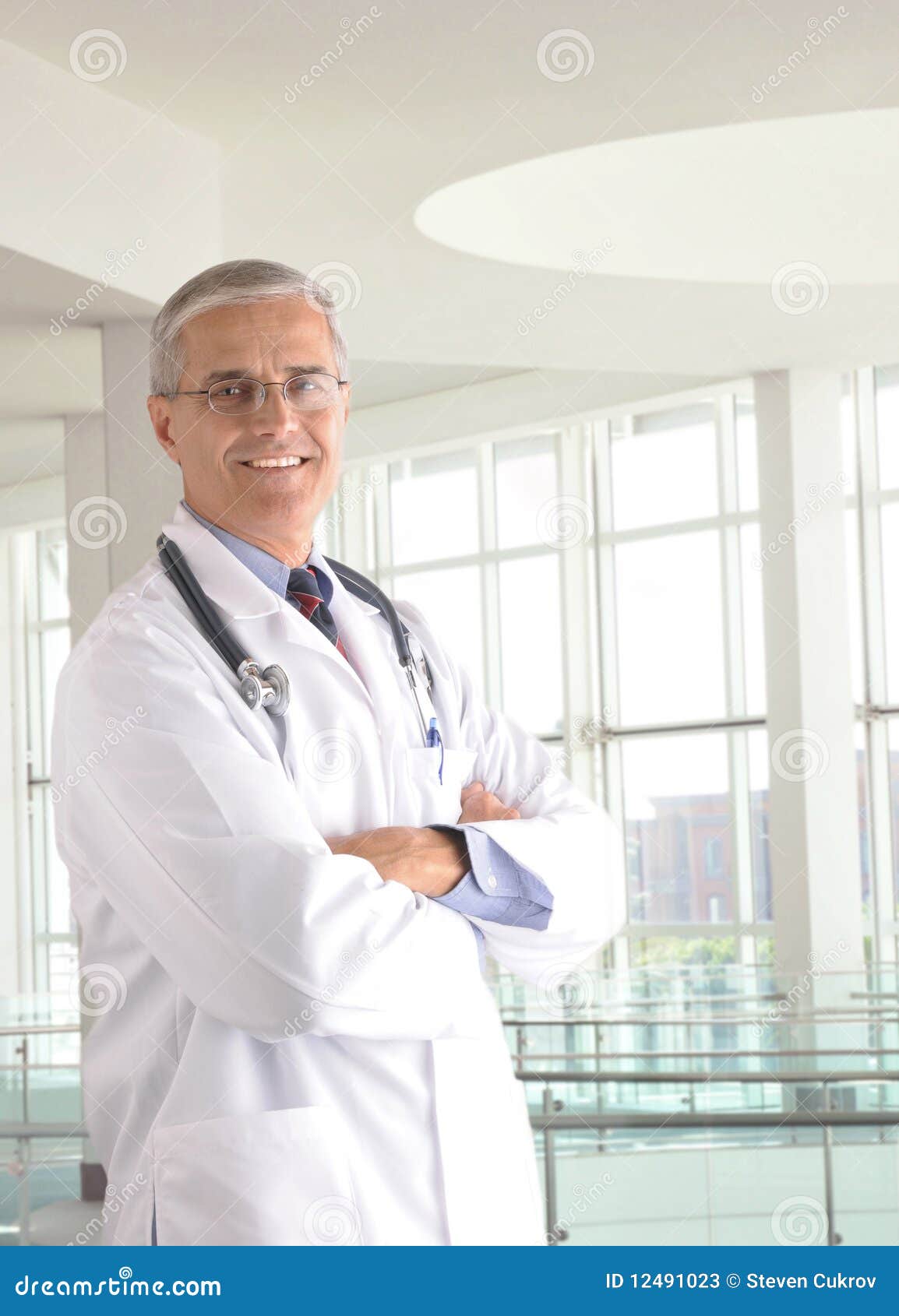 Middle Aged Doctor in Modern Medical Facility Stock Image - Image of ...
