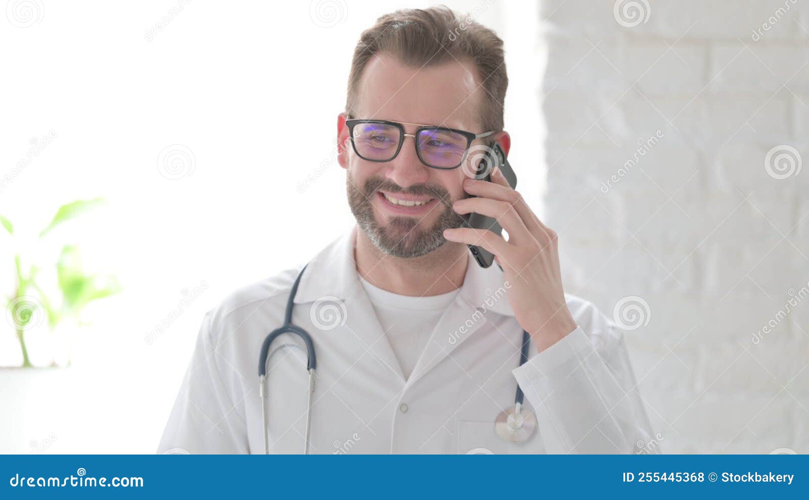 Portrait of Doctor Talking on Phone Stock Photo - Image of technology ...