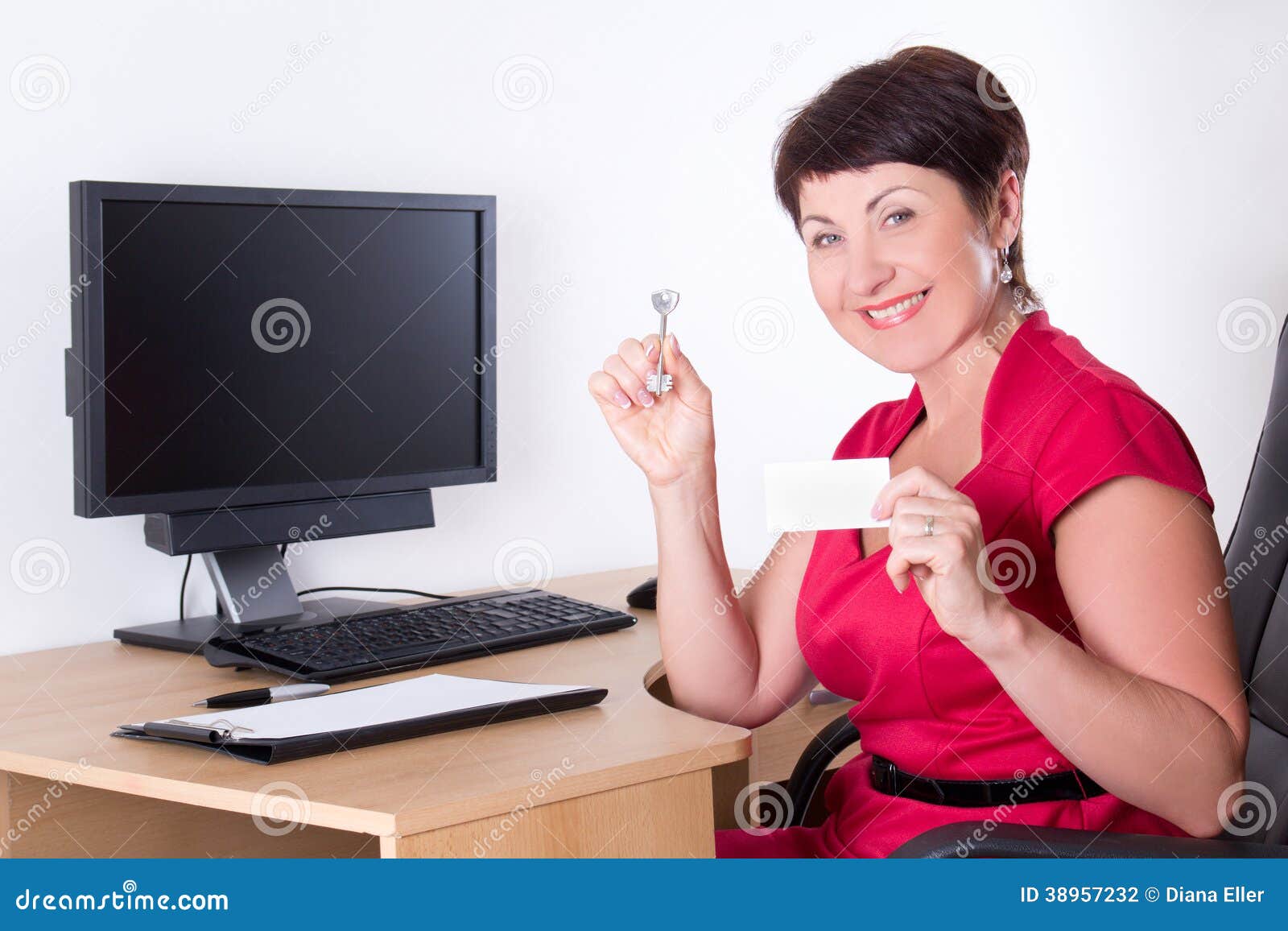 Middle Aged Estate Agent Sitting in Office Stock Photo - Image of ...