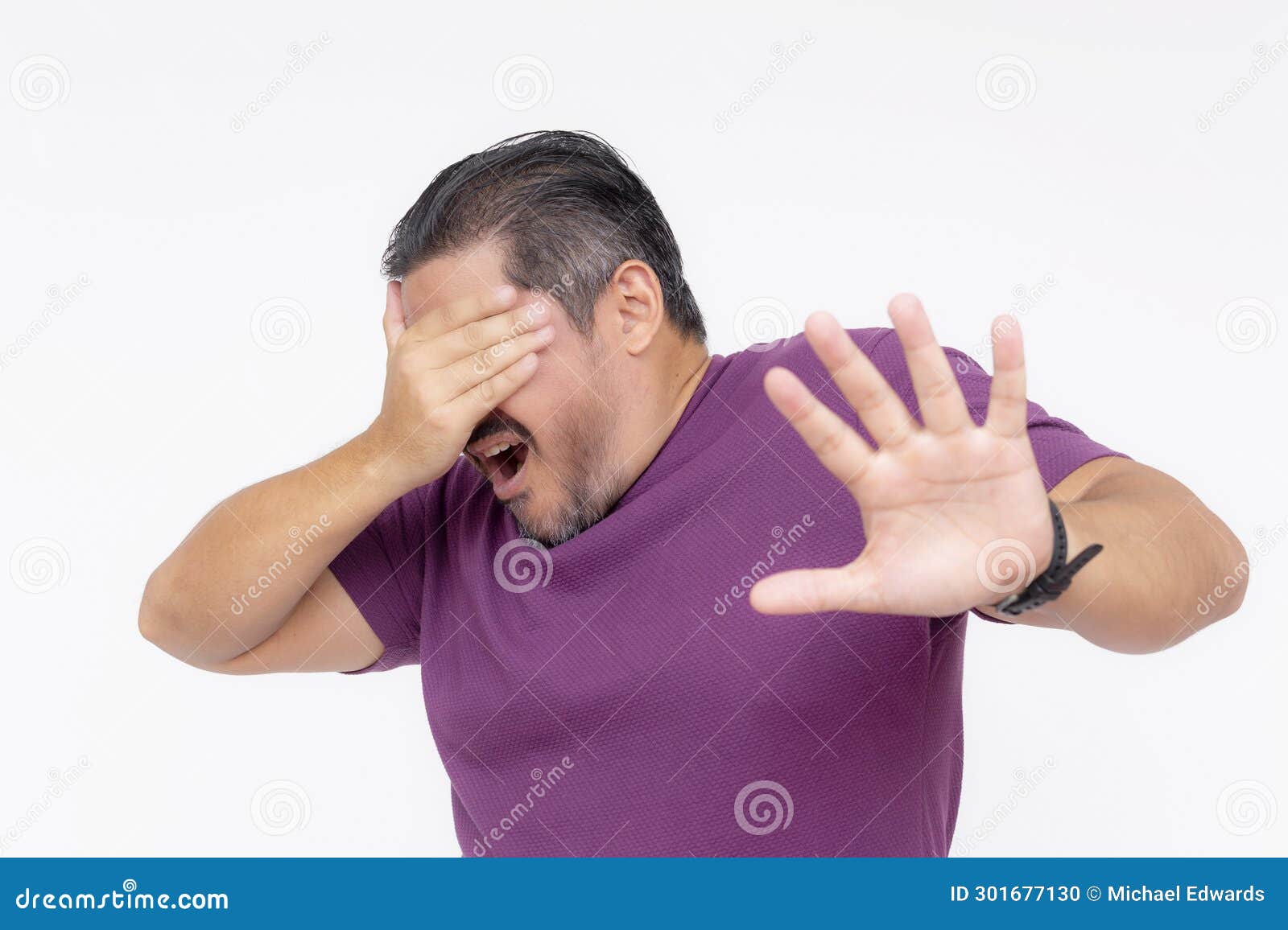 A Middle Aged Guy Covering His Eyes while Refusing Look, Begging ...