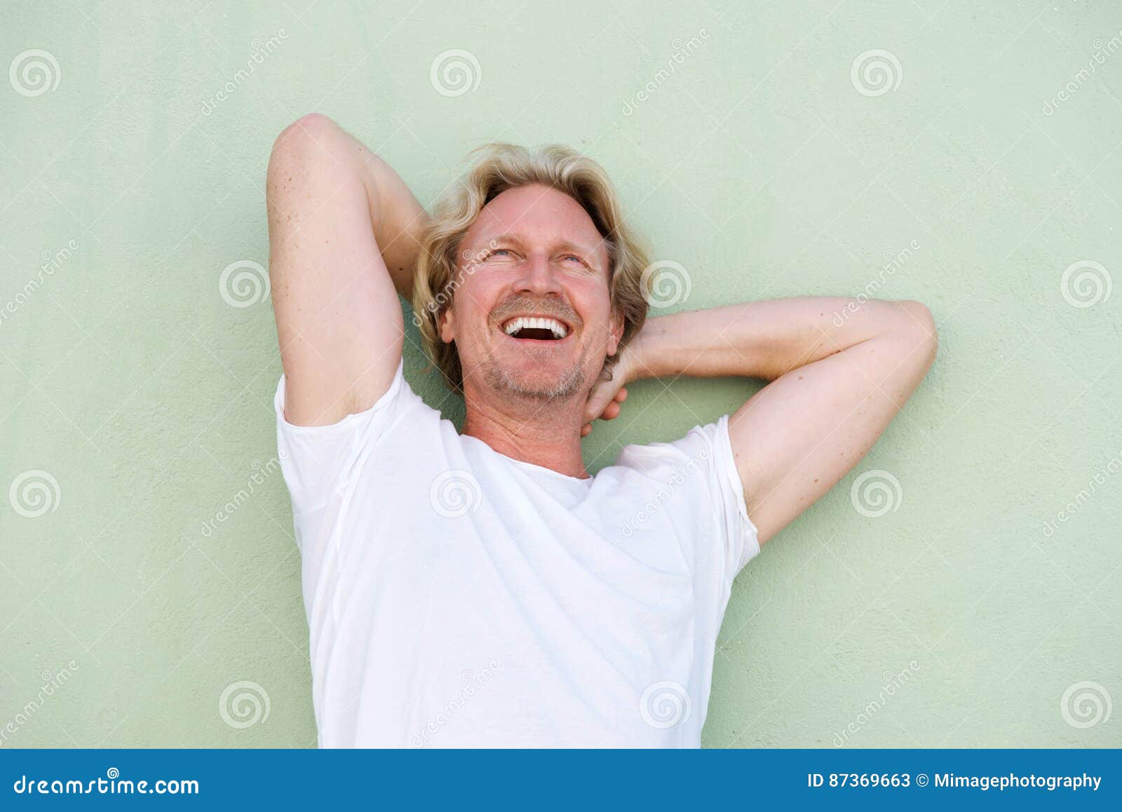 Middle Aged Guy Laughing with Hands Behind Head Stock Image - Image of ...