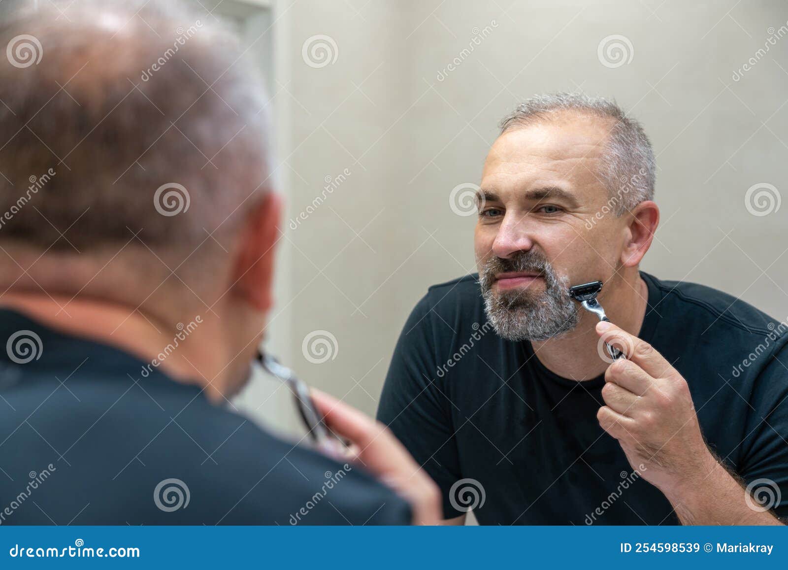 Middle-aged Handsome Man Using Razor in Bathroom Stock Image - Image of ...