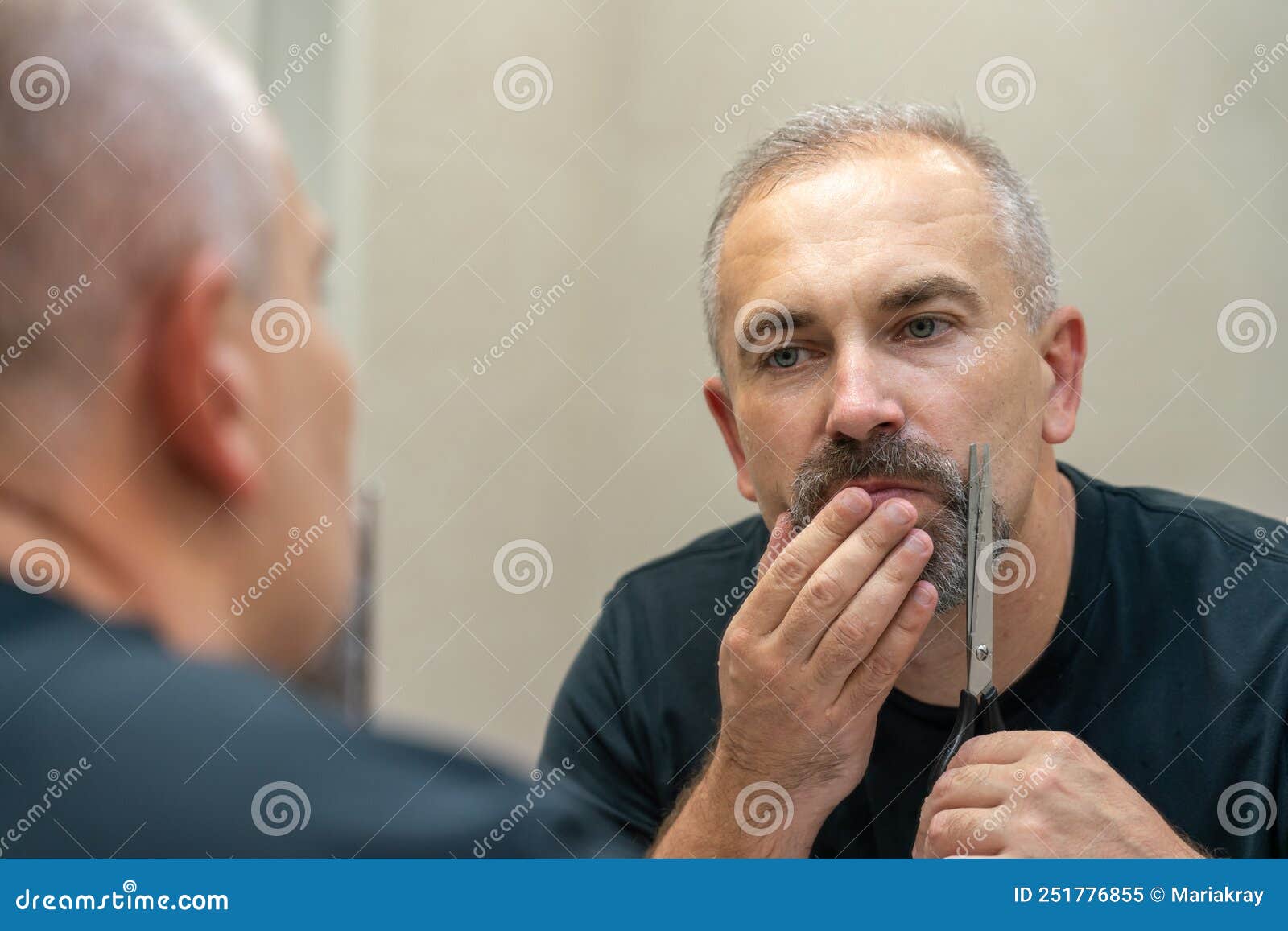Middle-aged Handsome Man Using Scissors To Cut His Beard a Litlie and ...