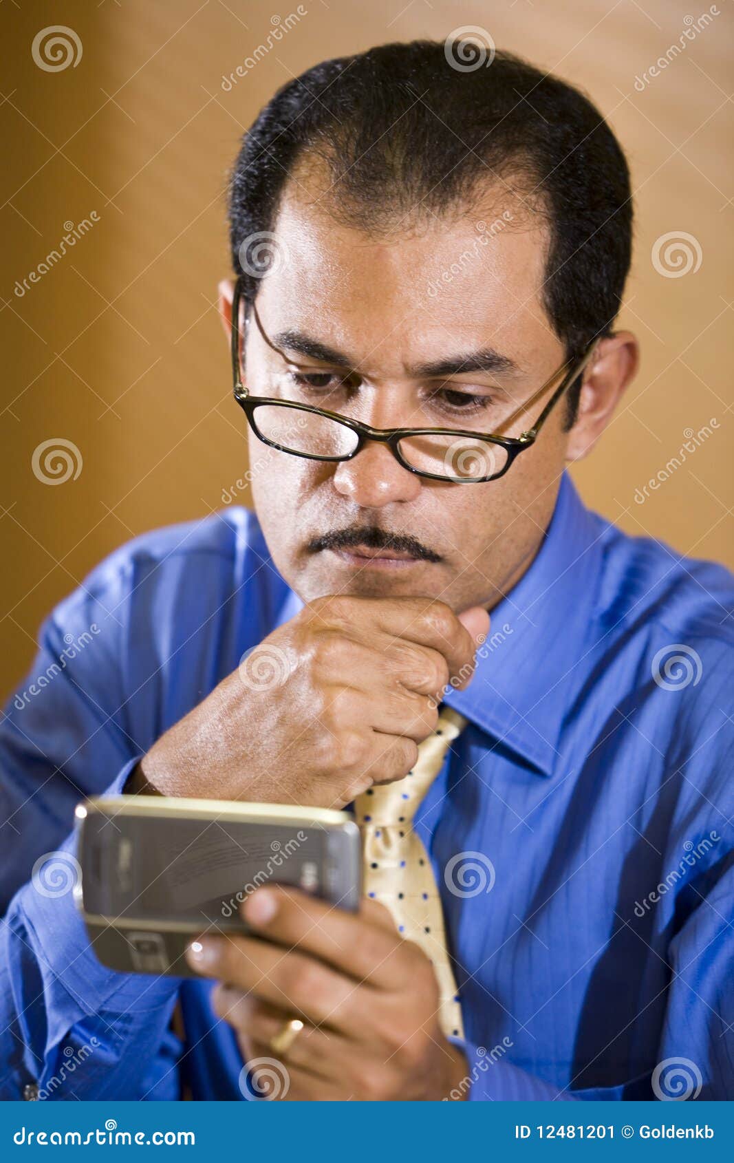Middle-aged Hispanic Businessman Texting Stock Image - Image of ...