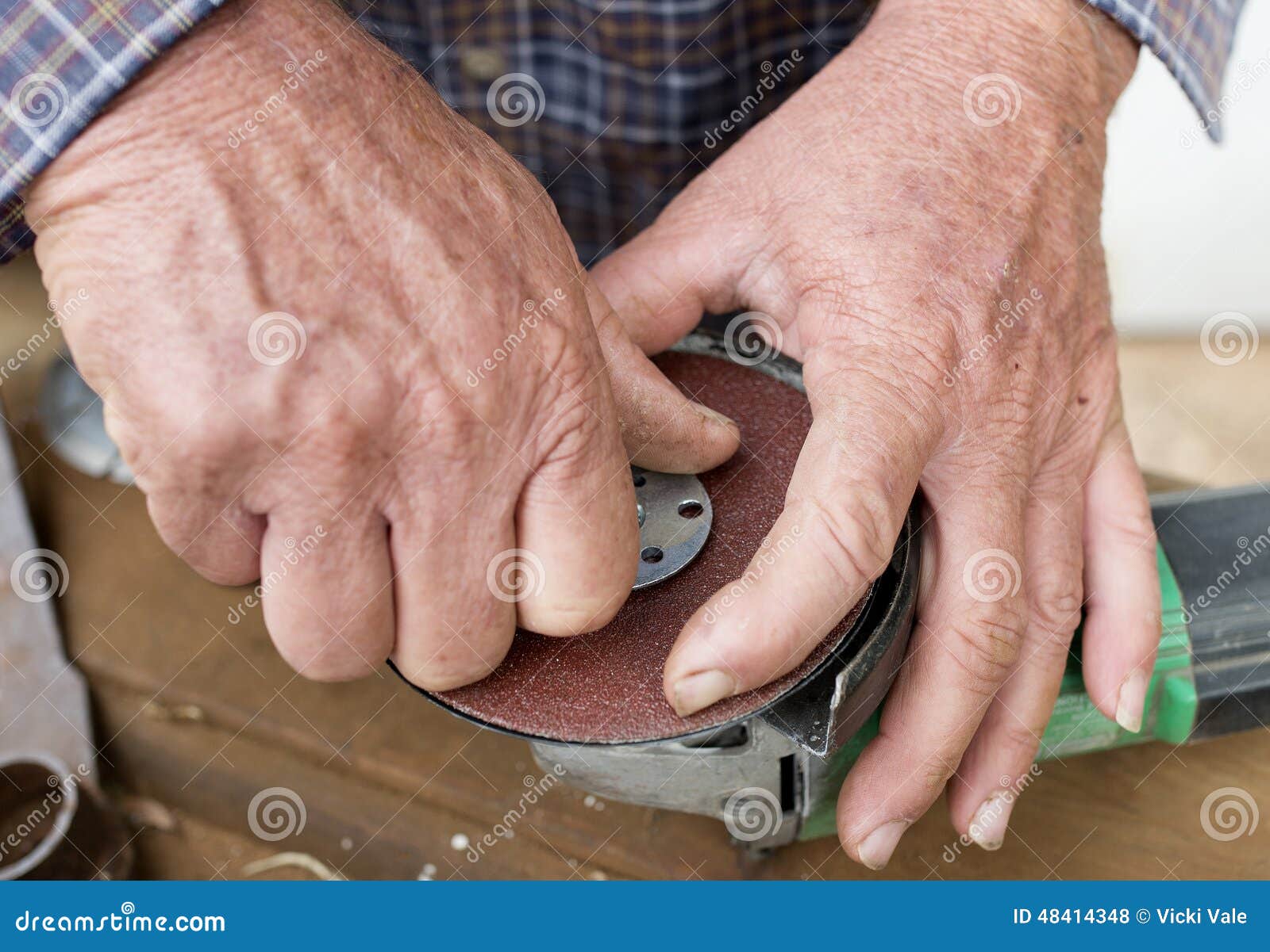 Middle-aged Man Assembling Sanding Disk on Grinder. Stock Photo - Image ...