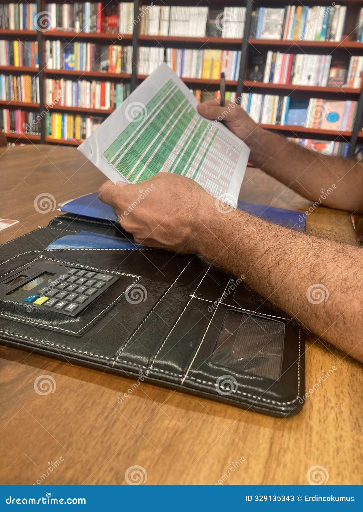 Middle Aged Man Calculating and Checking Papers Stock Image - Image of ...