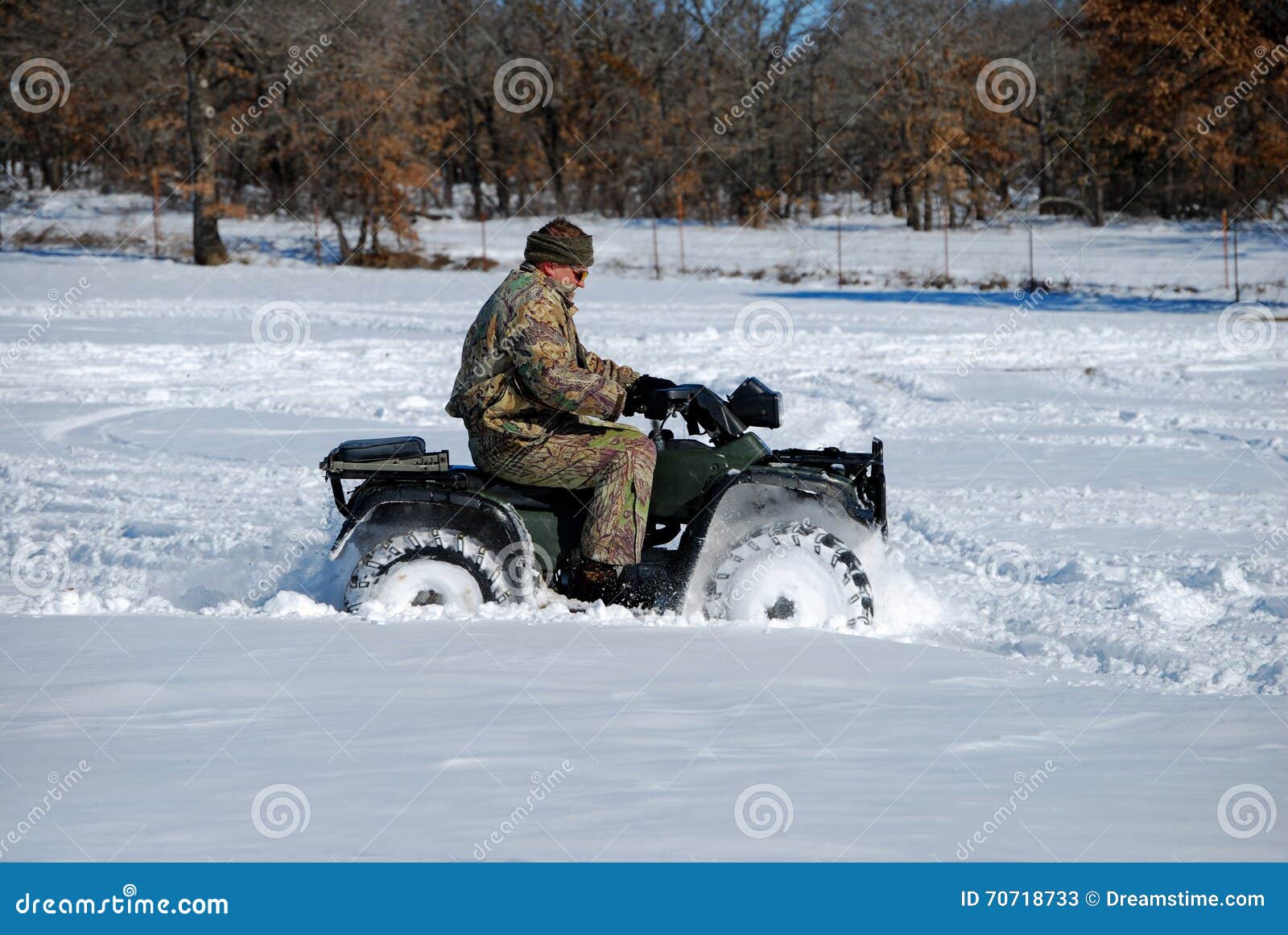 Middle-aged Man in Camo Riding Four Wheeler. Stock Image - Image of ...