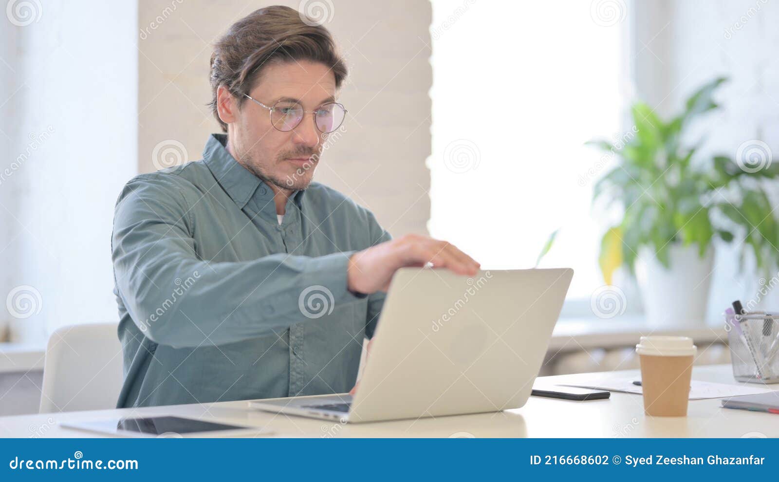 Middle Aged Man Closing Laptop Going Away from Office Stock Photo ...