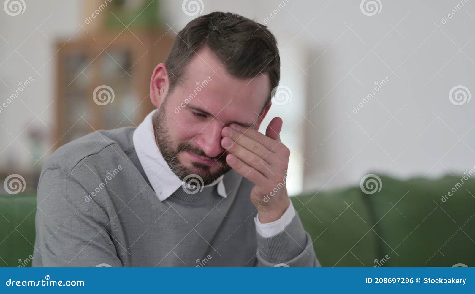 Middle Aged Man Crying while Sitting on Sofa Stock Footage - Video of ...