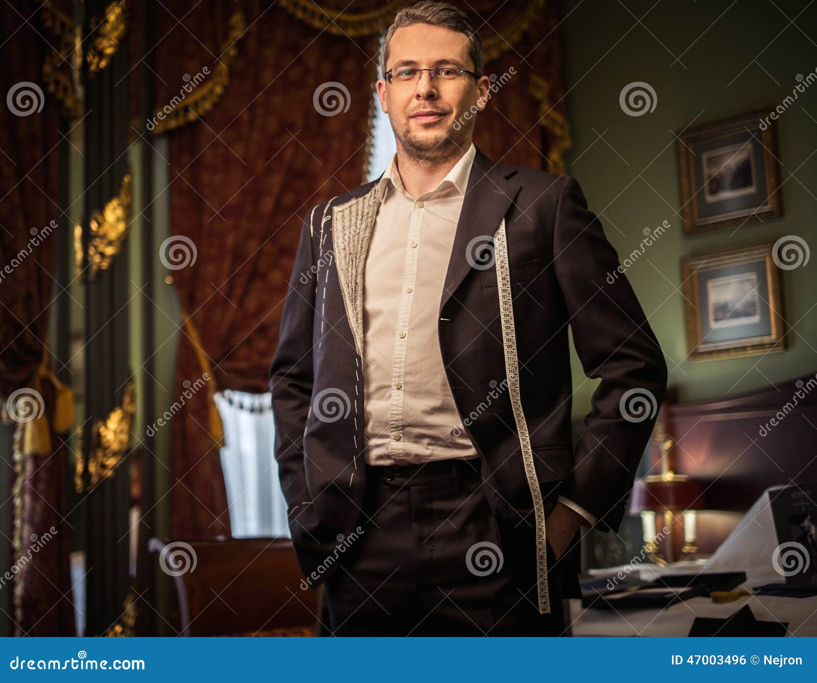 Middle-aged Man in Custom Made Suit Stock Photo - Image of sewing ...