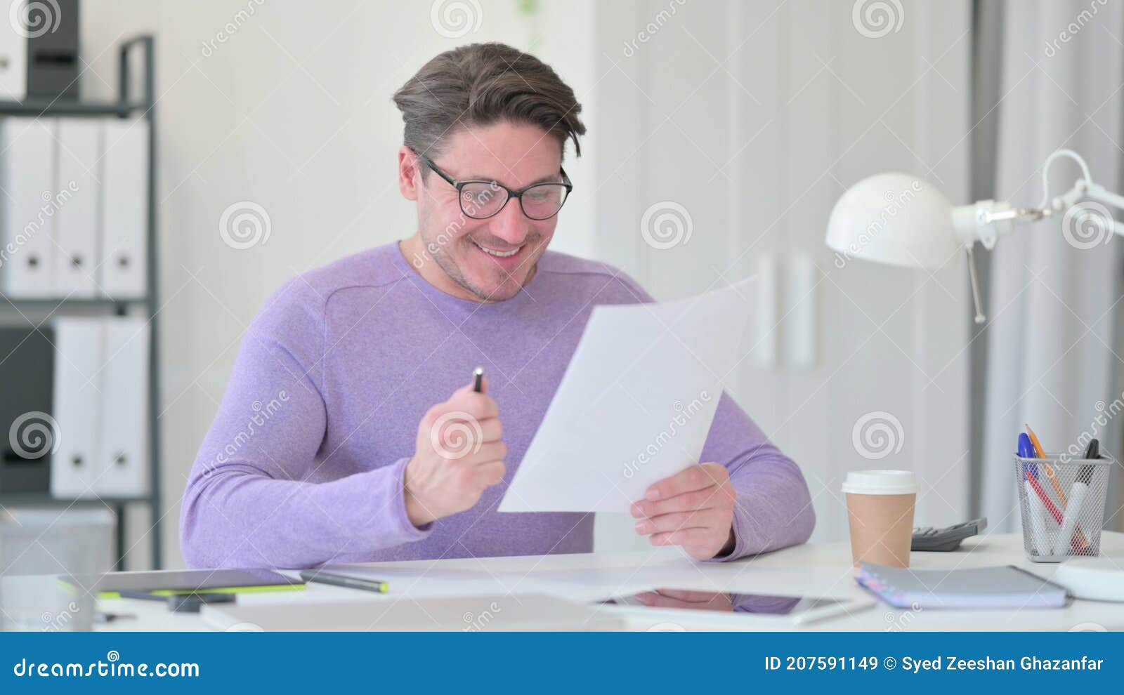 Middle Aged Man with Documents Celebrating Success Stock Image - Image ...