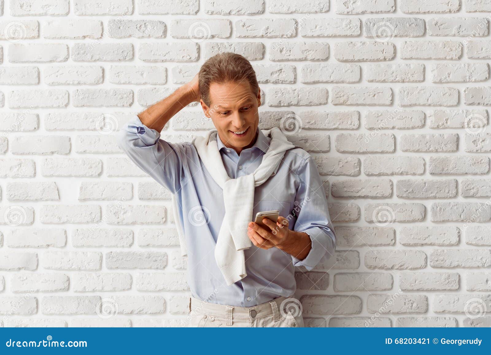 Middle Aged Man with Gadget Stock Image - Image of adult, gentleman ...