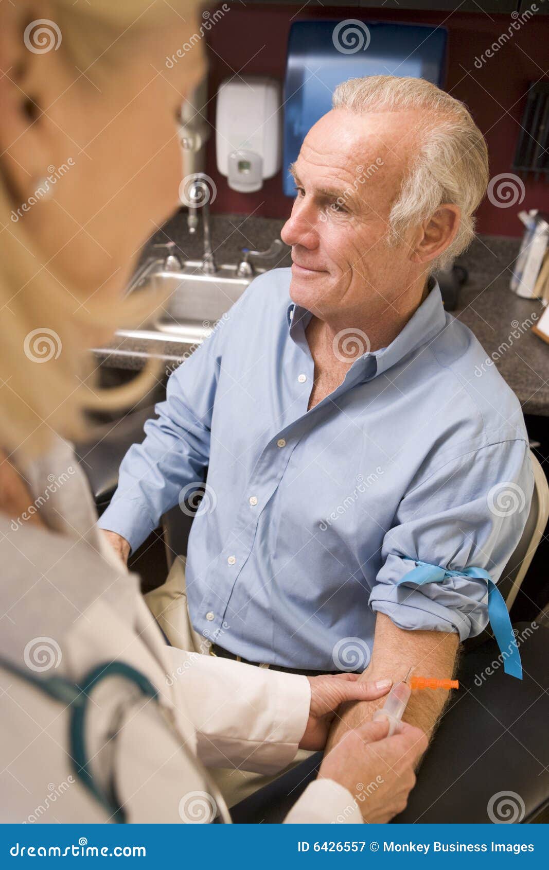 Middle Aged Man Having Blood Test Done Stock Image - Image of indoors ...