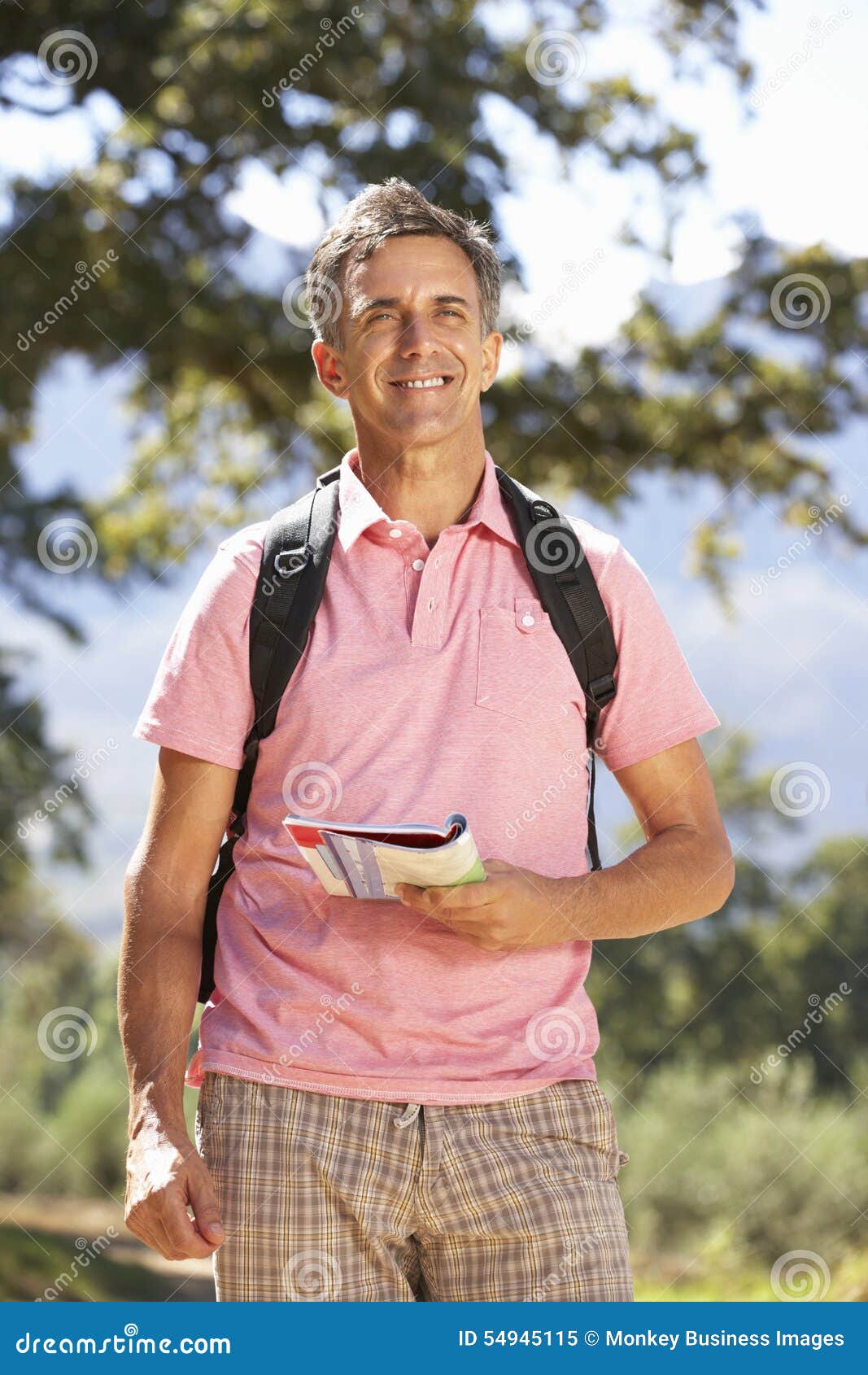 Middle Aged Man Hiking through Countryside Stock Image - Image of ...