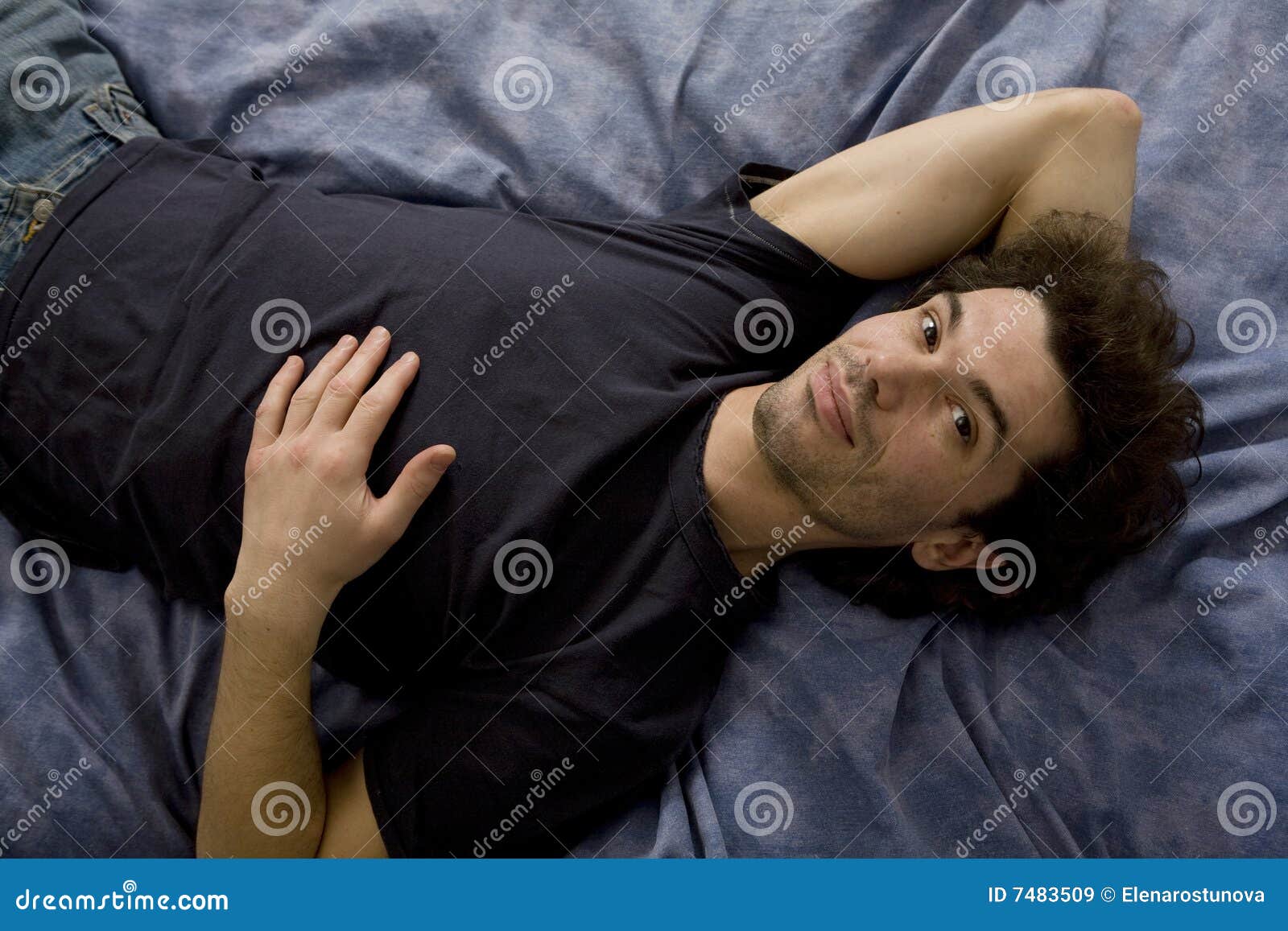 Middle-aged Man Lying on the Bed Stock Image - Image of smiling ...