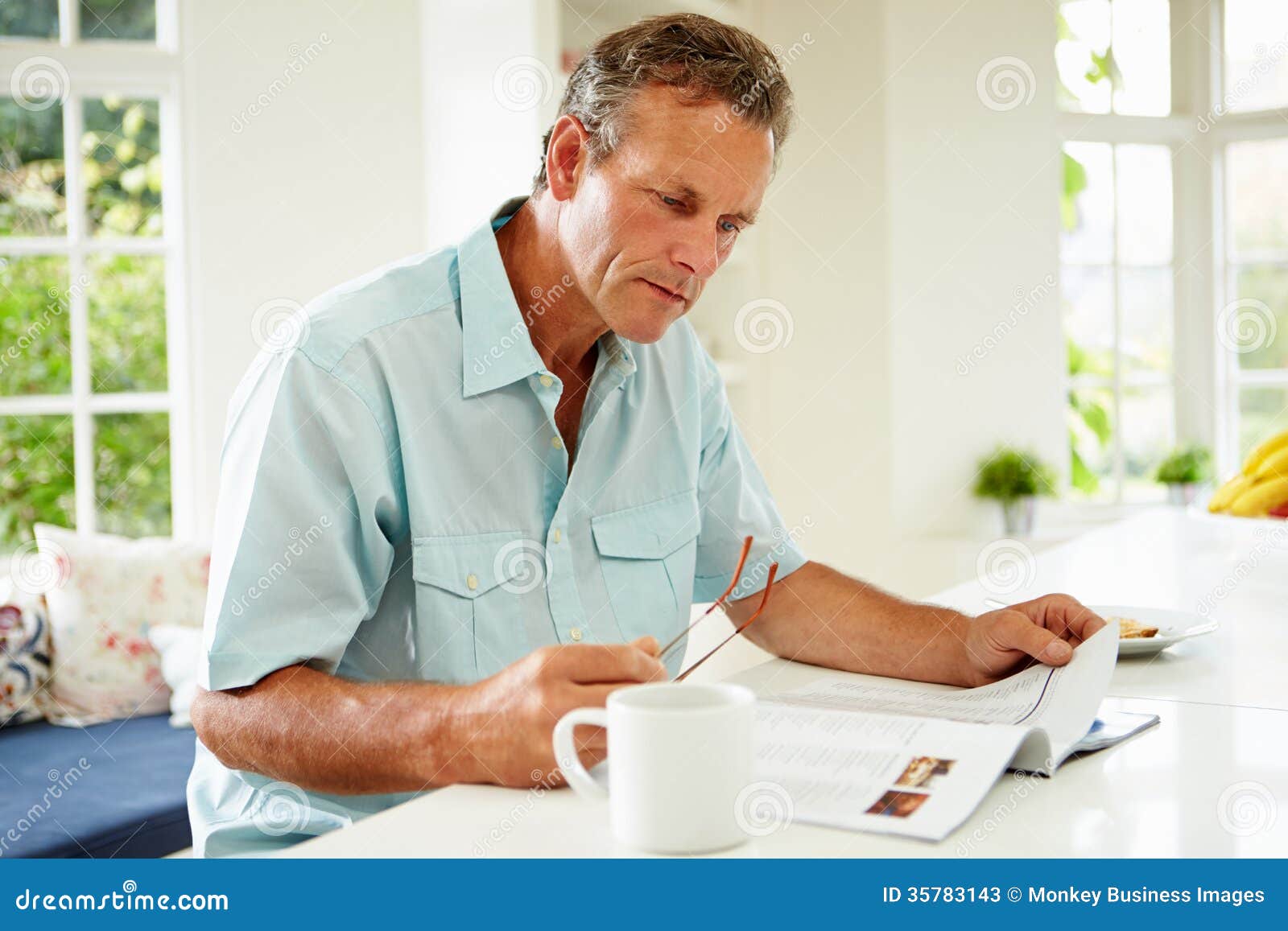 Person Reading Magazine