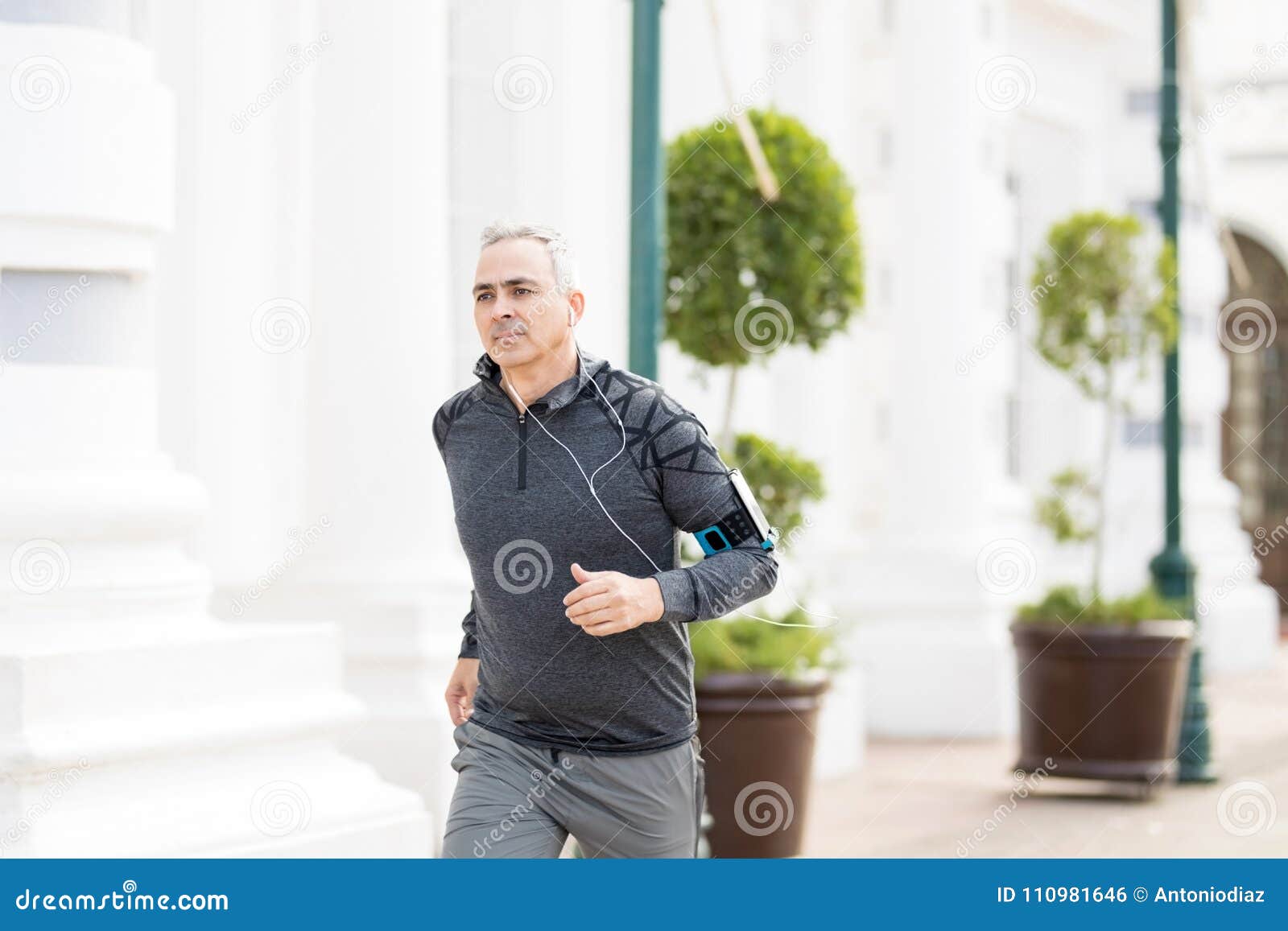Middle Aged Man Running in the City Stock Photo - Image of copy, people ...