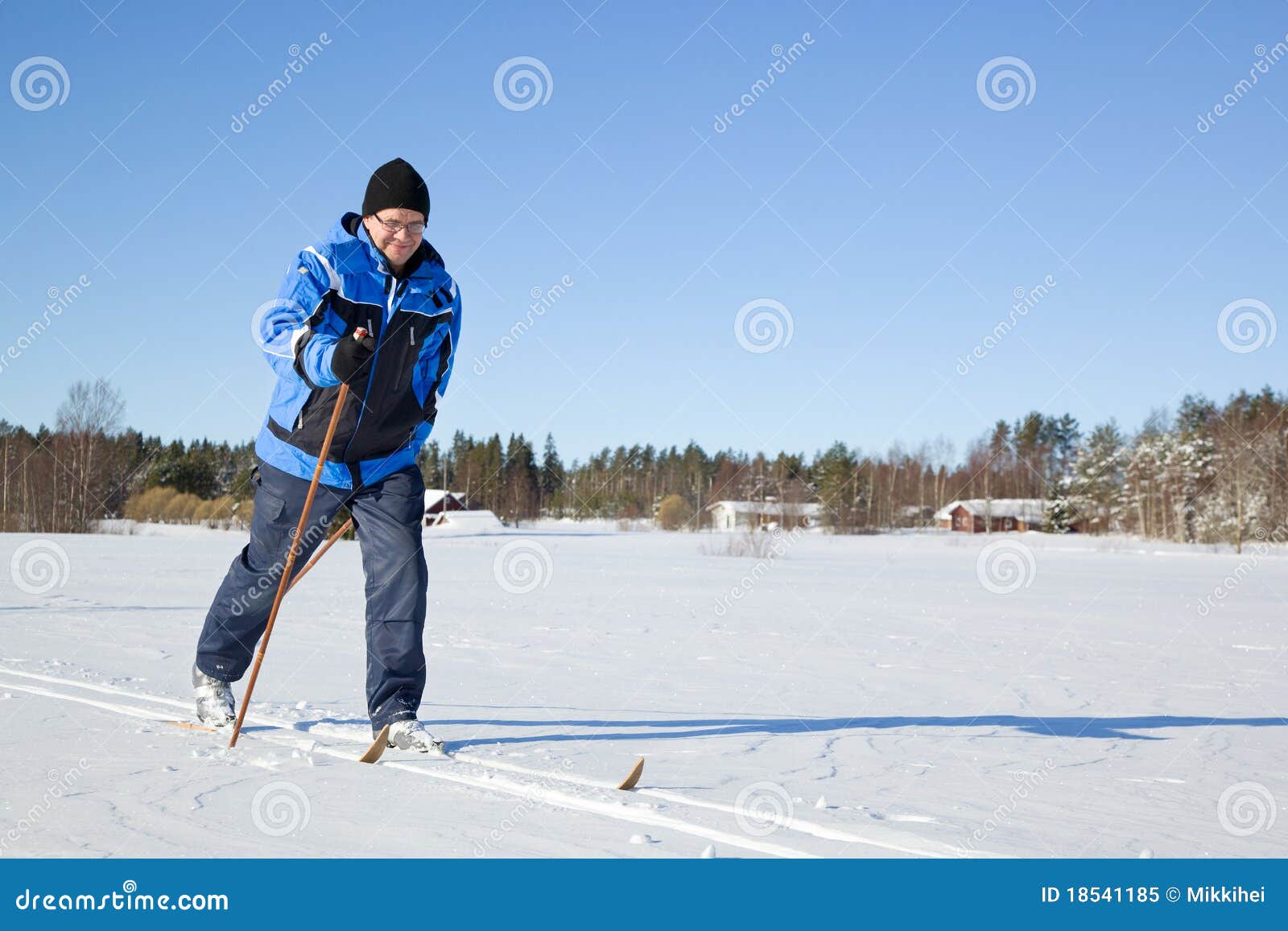 Middle-aged man skiing stock image. Image of motion, action - 18541185