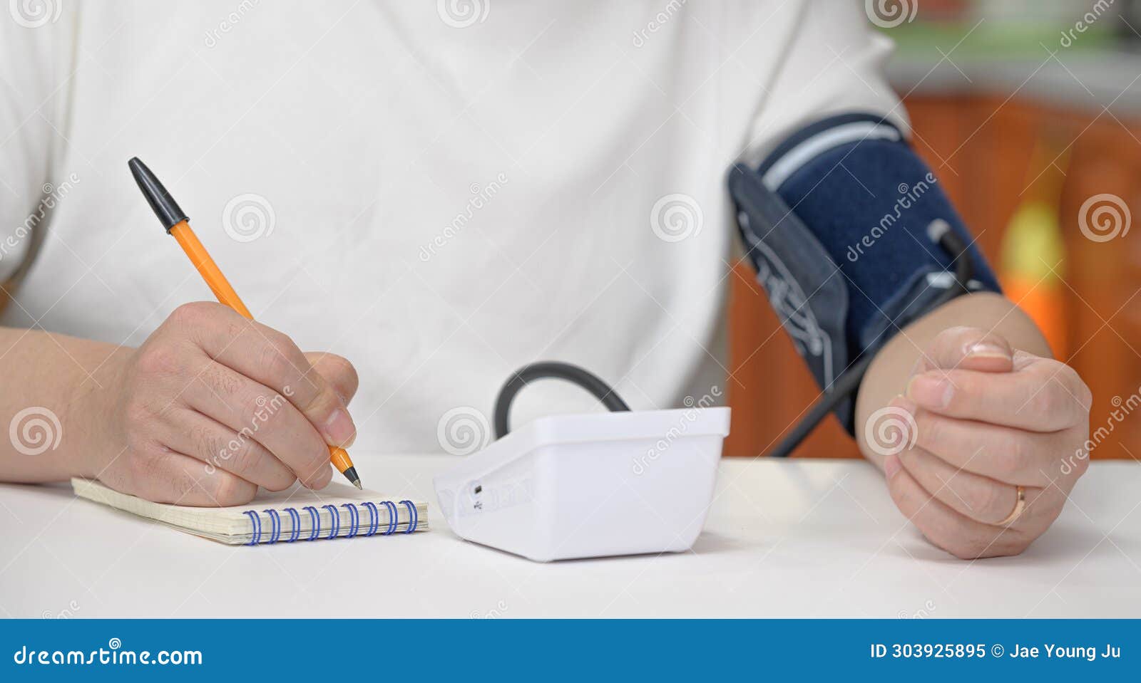 Middle-aged Man Using Blood Pressure Monitor Stock Image - Image of ...