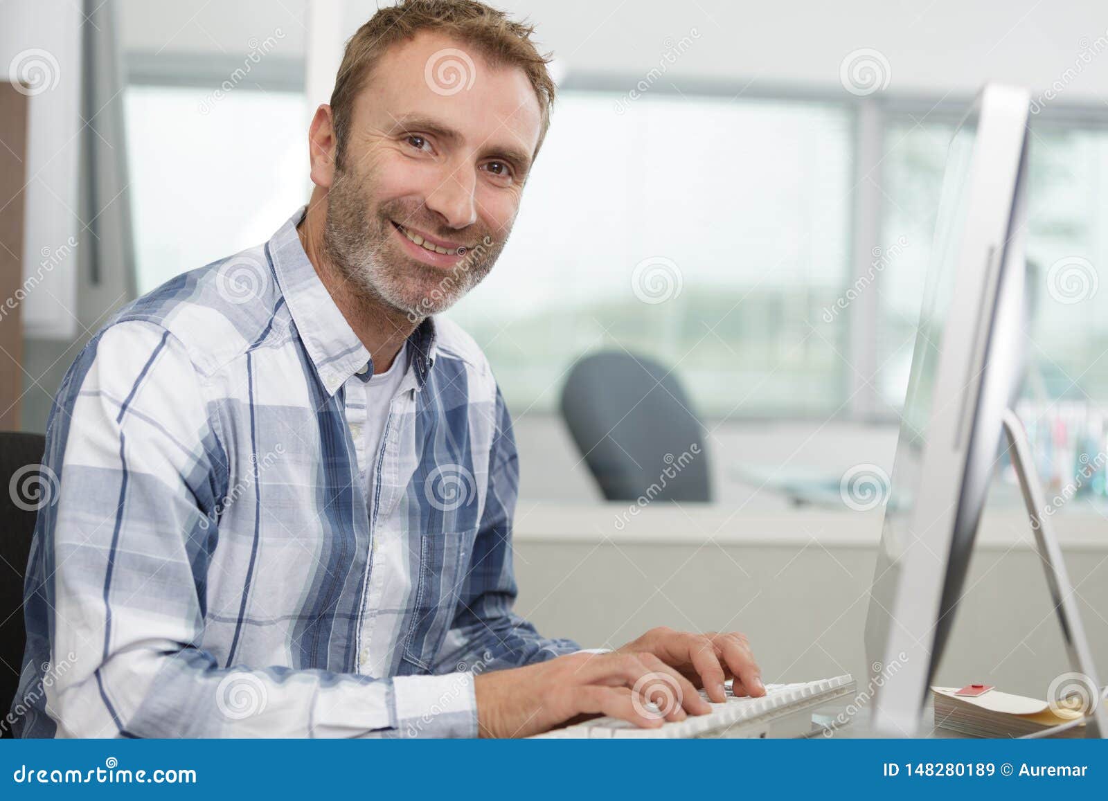 Middle Aged Man Using Computer in Workplace Stock Image - Image of ...