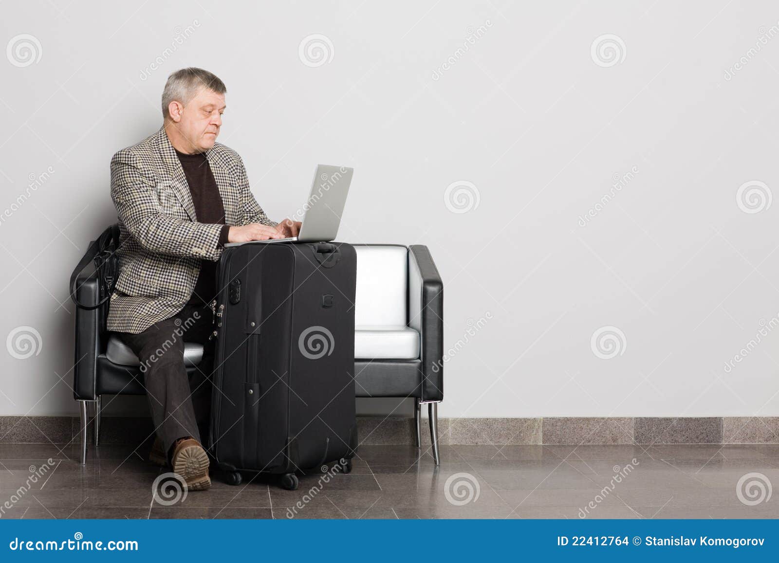 Middle Aged Man Using a Laptop. Stock Photo - Image of people, hall ...