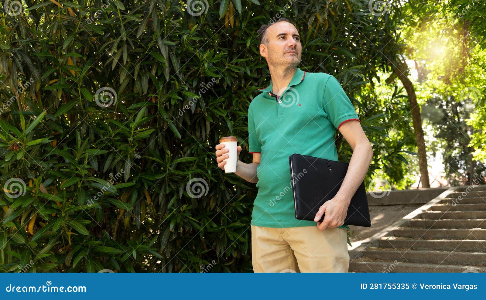 Middle-aged Man Walking Down the Stairs of a Park with His Folder and ...
