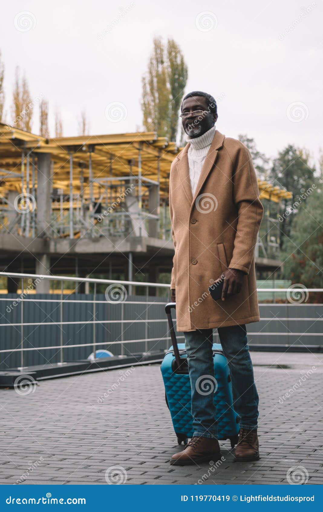Middle Aged Man Walking on a Street with a Stock Image - Image of ...