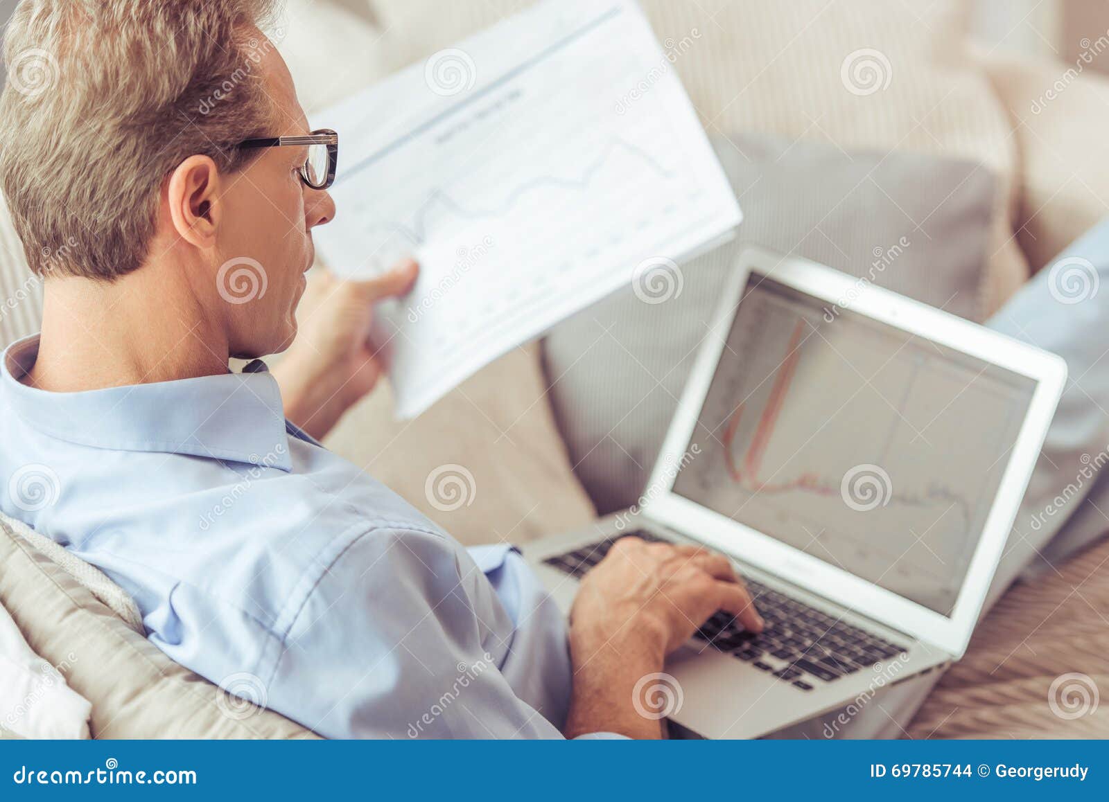 Middle aged man working stock photo. Image of expression - 69785744